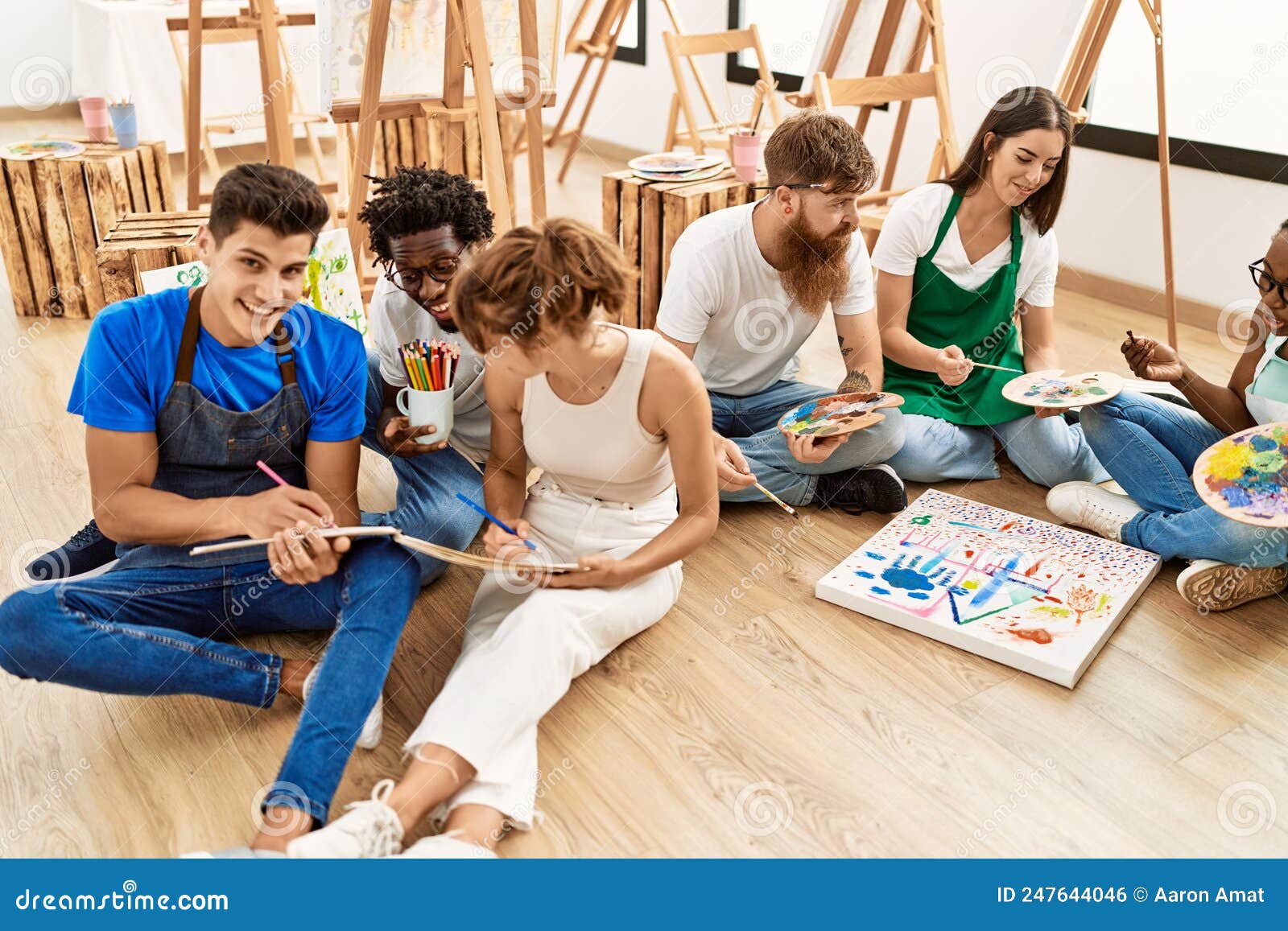 Group of People Smiling Happy Drawing Sitting on the Floor at Art ...
