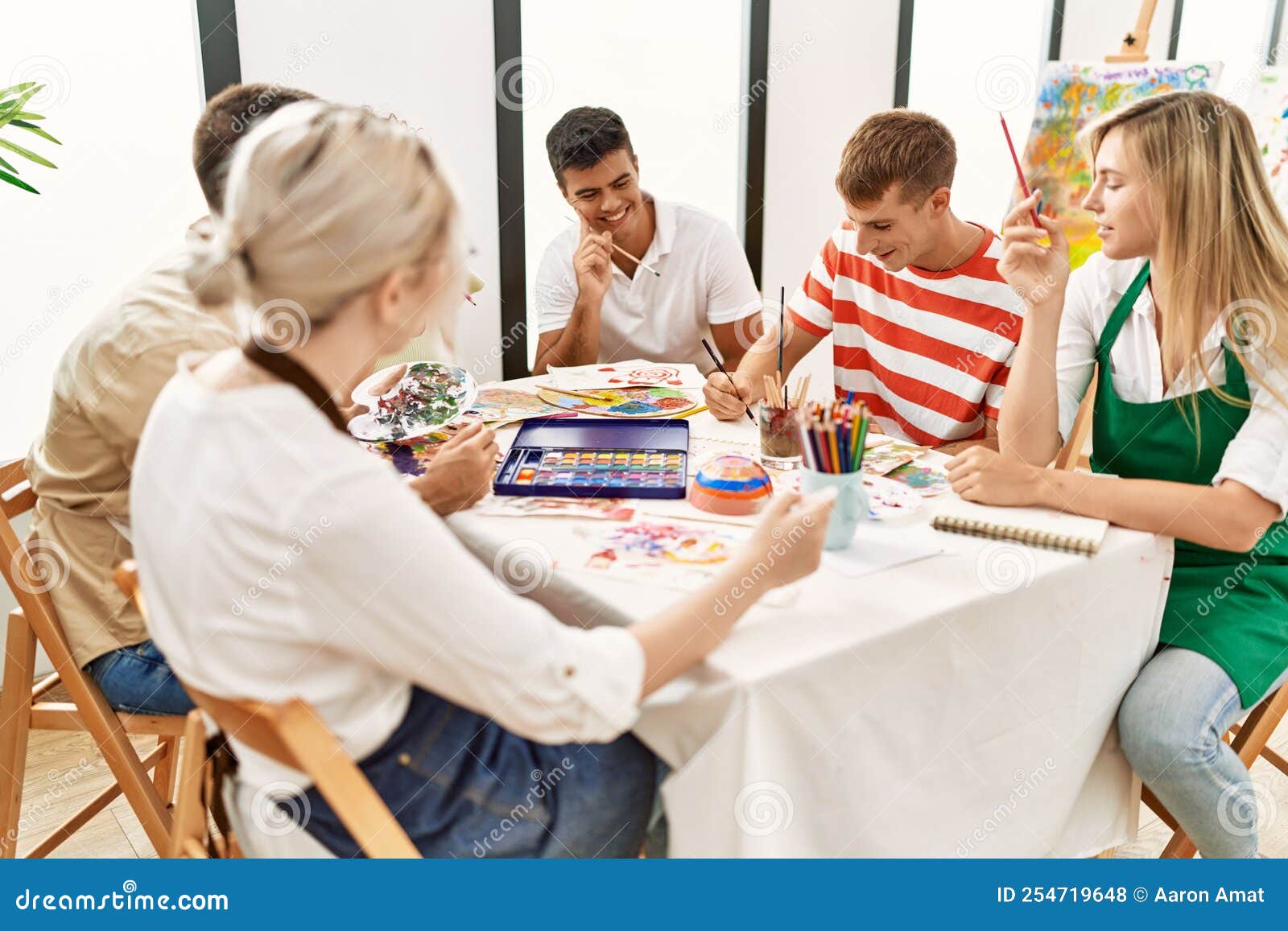 Group of People Smiling Happy Drawing Sitting on the Table at Art ...