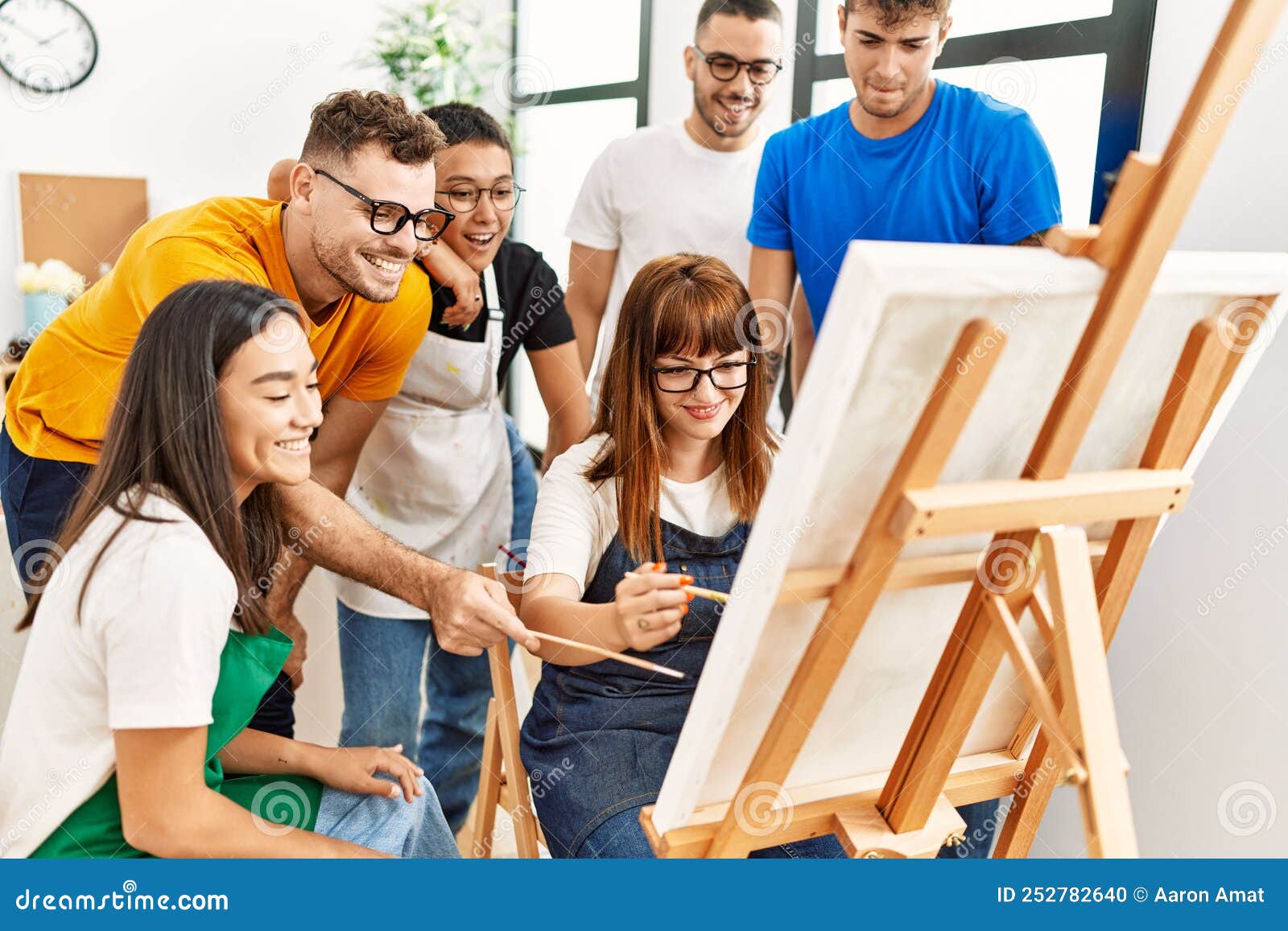 Group of People Smiling Happy and Looking Draw of Partner at Art Studio ...