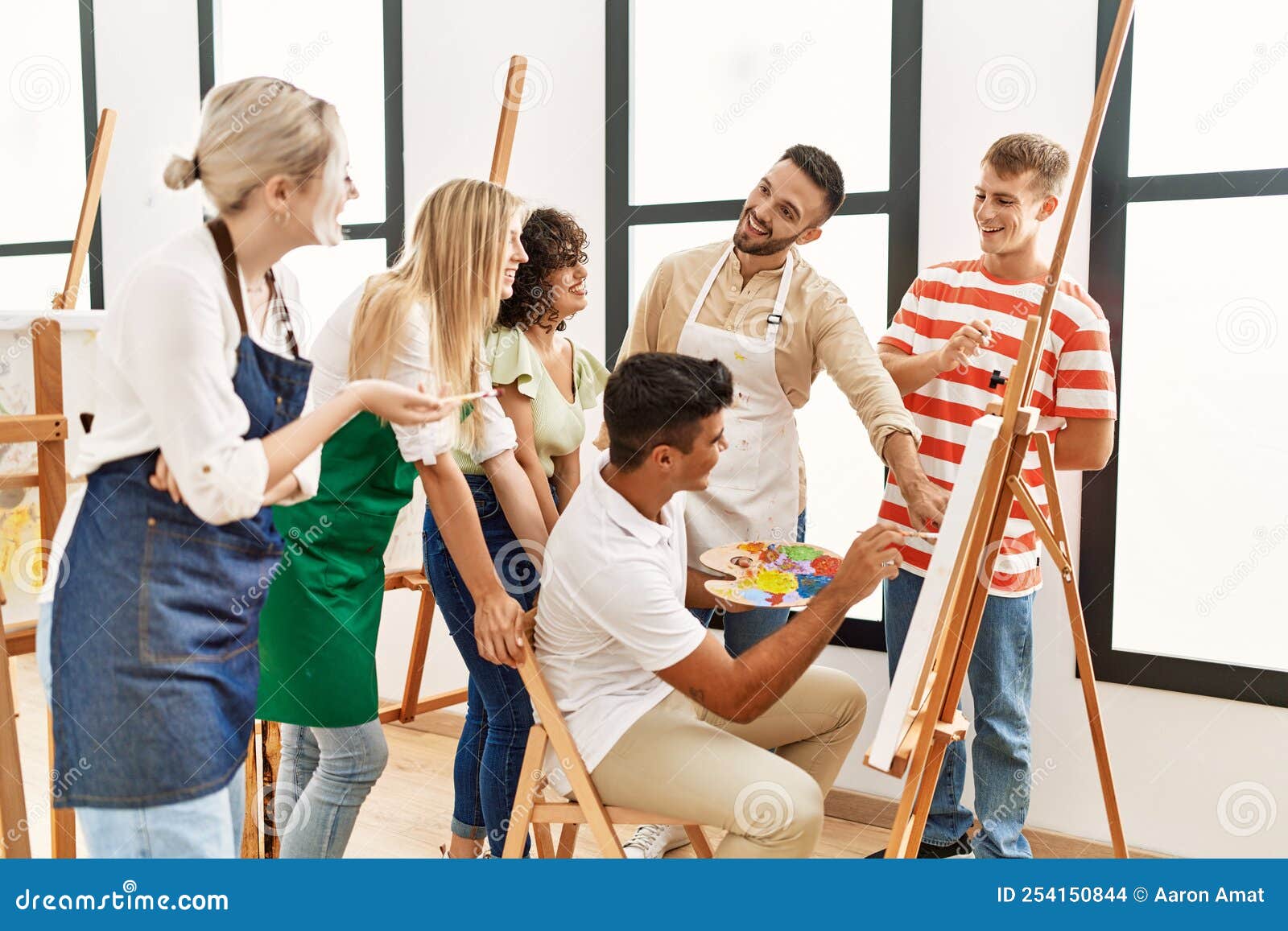 Group of People Smiling Happy and Looking Draw of Partner at Art Studio ...