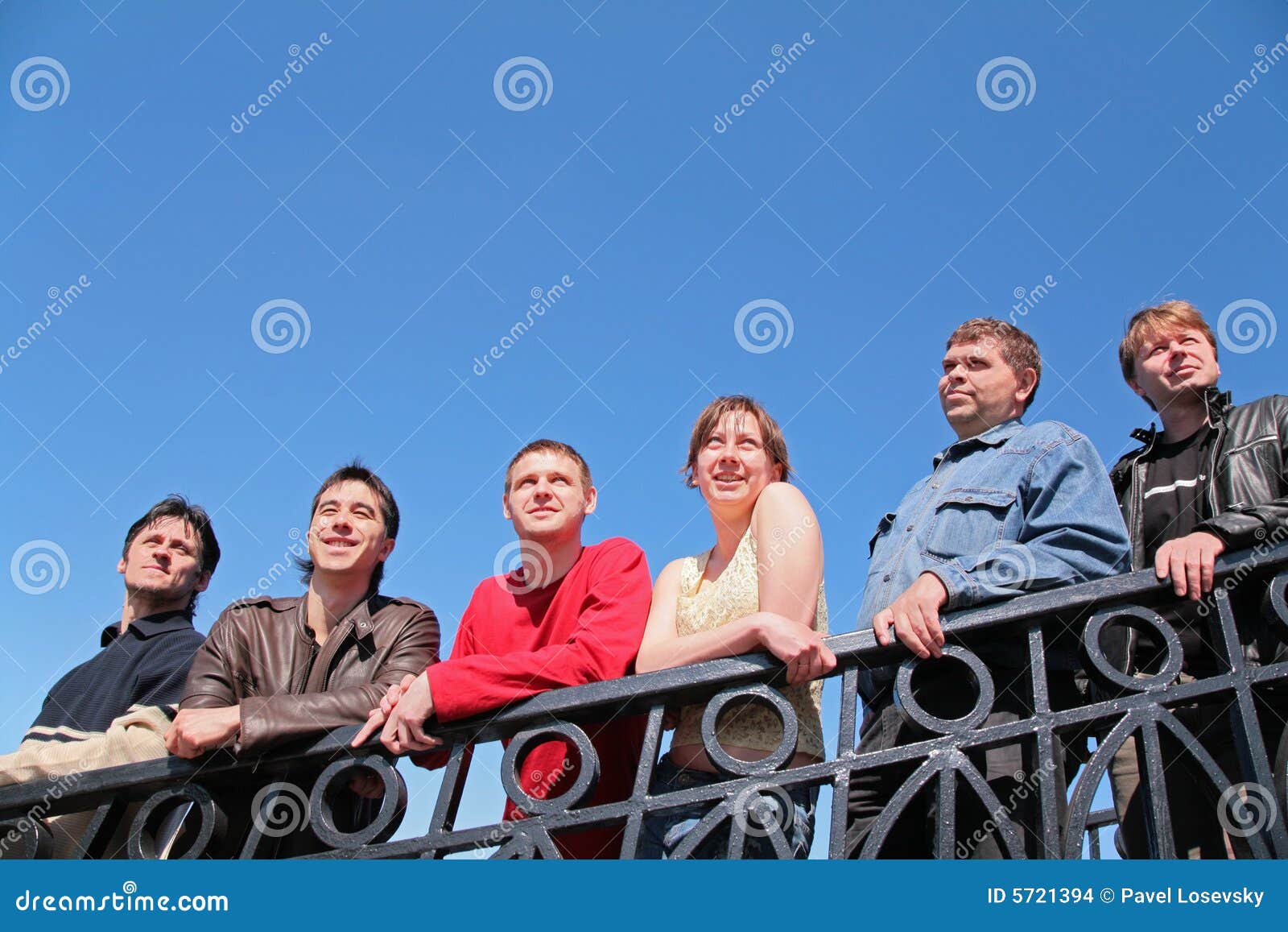 Group of People Stand Leaning on Handrail Stock Photo - Image of life ...