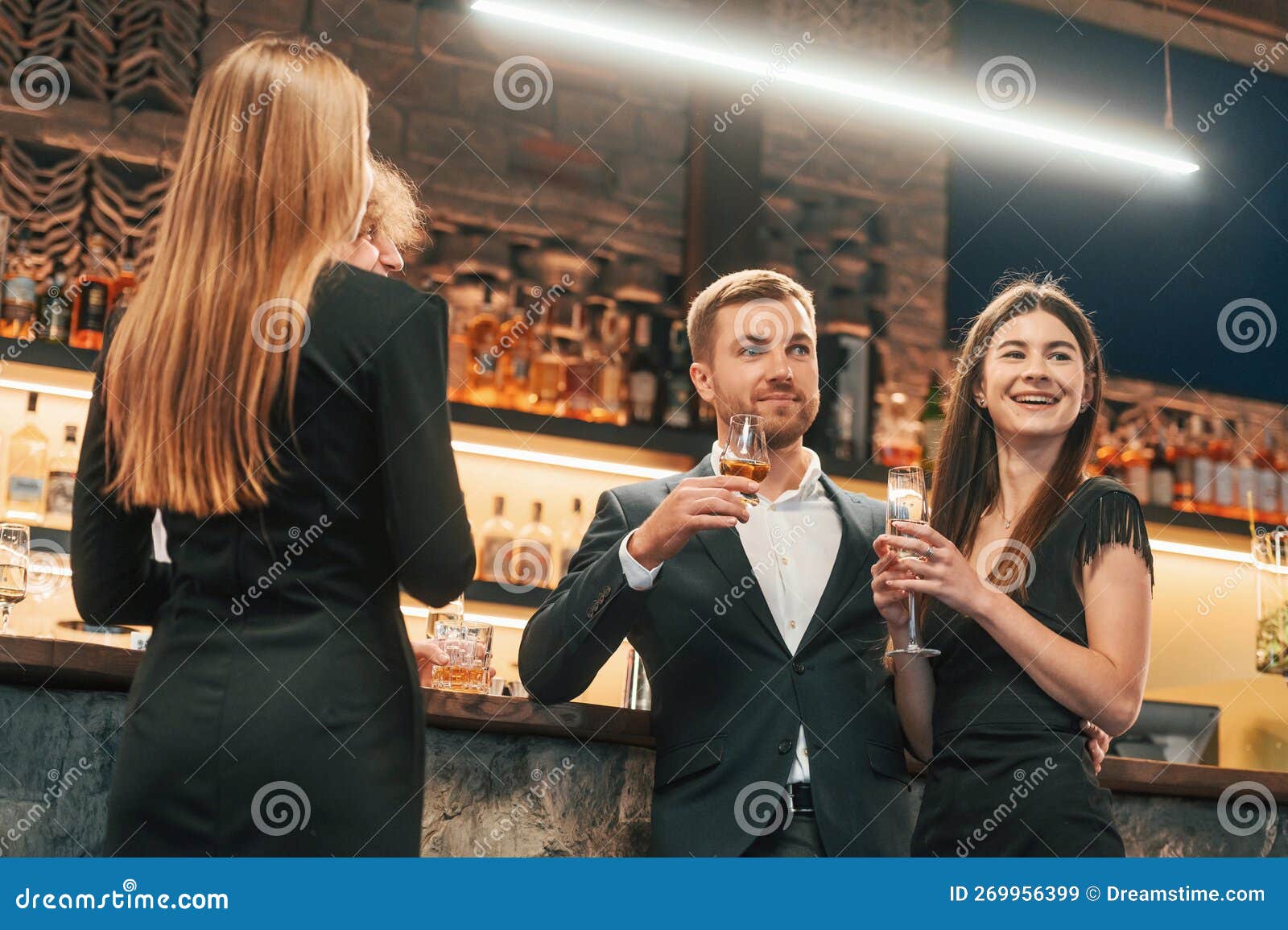 Group of People Standing with Glasses and Celebrating Event Together ...