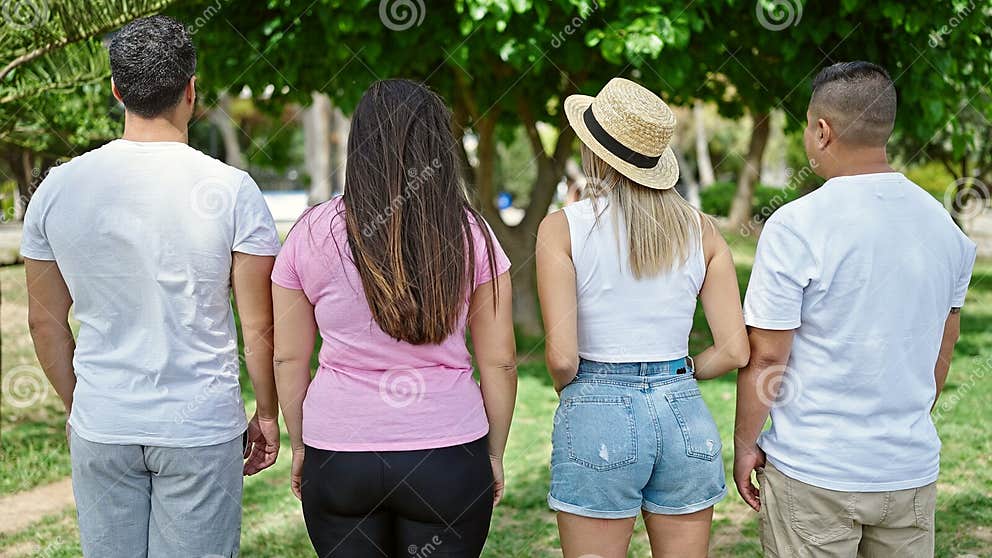 Group of People Standing Together Backwards at Park Stock Image - Image ...