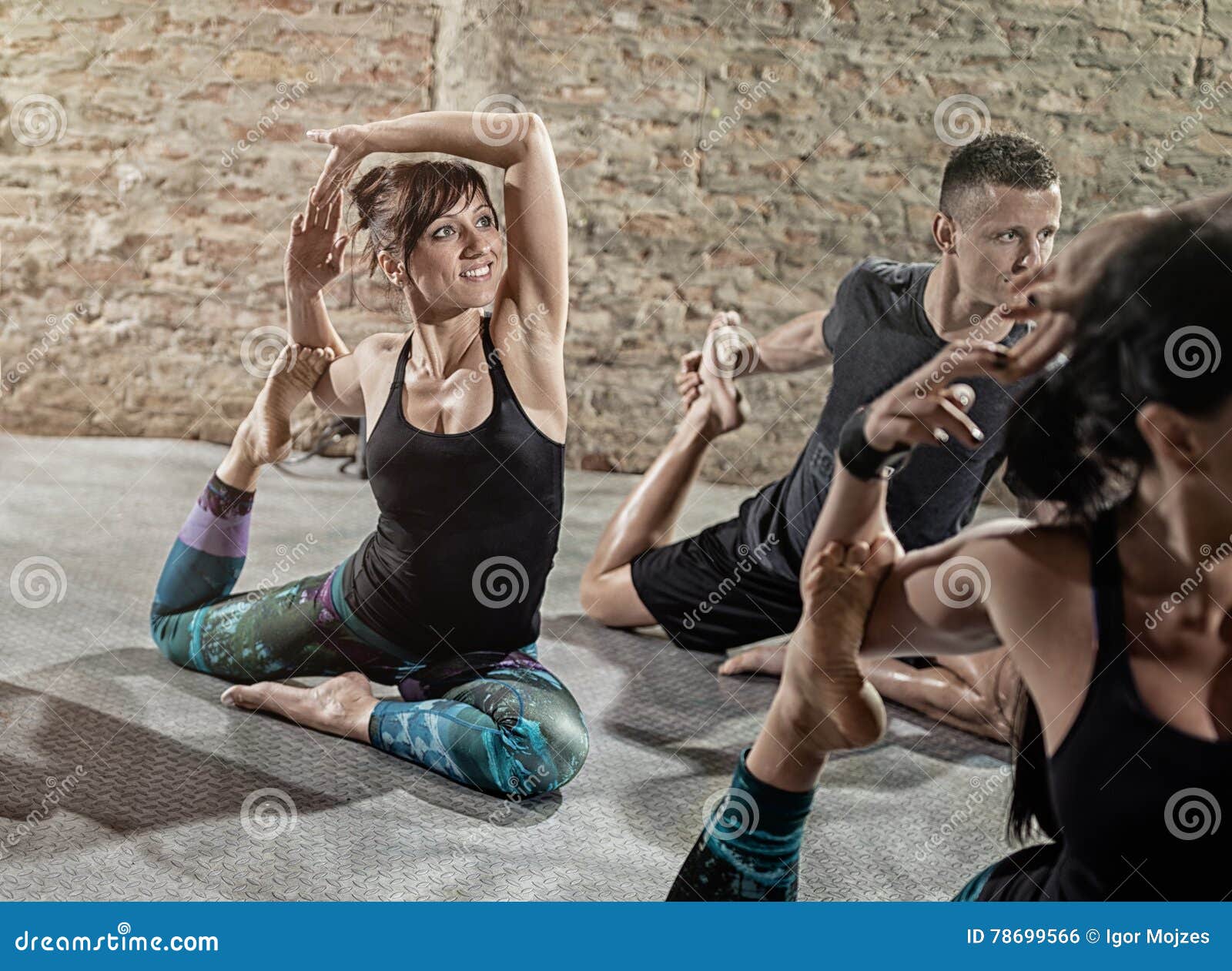 Group of people stretching stock photo. Image of pilates - 78699566