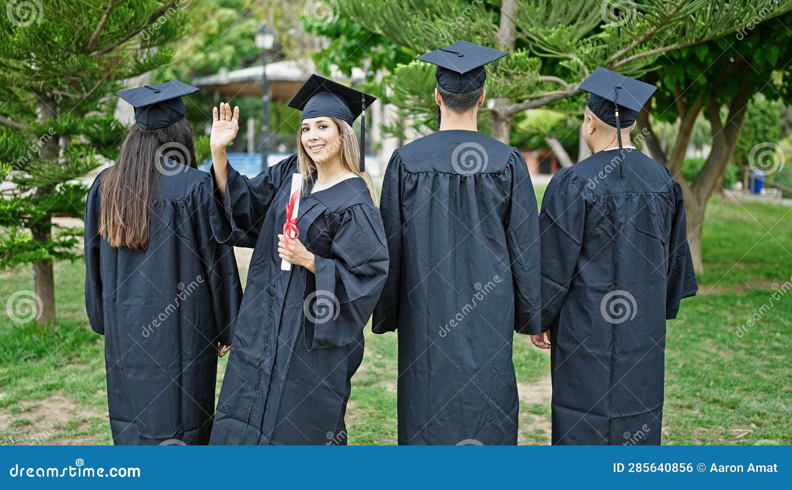 Group of People Students Graduated Holding Diploma Saying Hello with ...