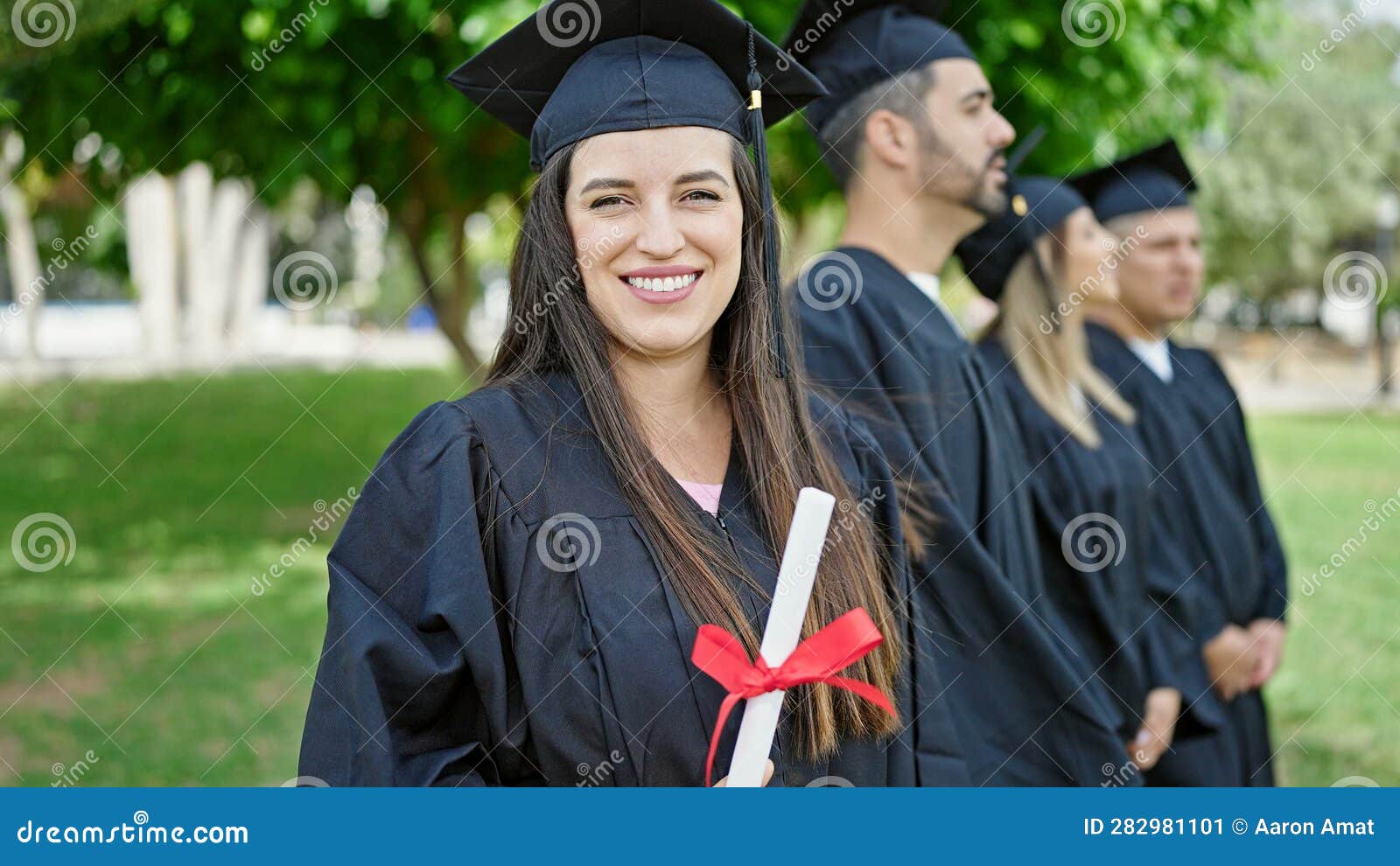 Group of People Students Graduated Holding Diploma at University Campus ...