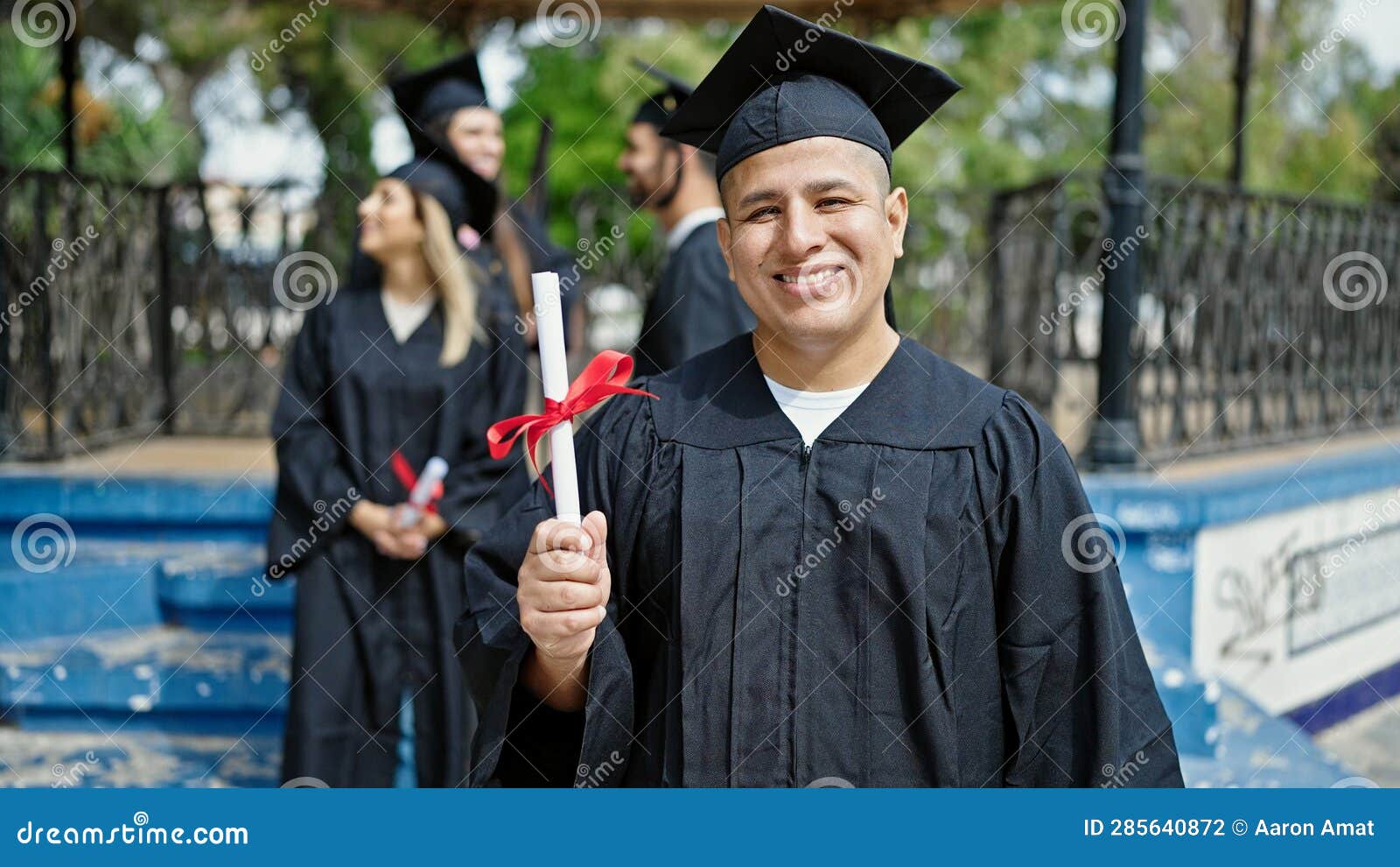Group of People Students Graduated Holding Diploma at University Campus ...