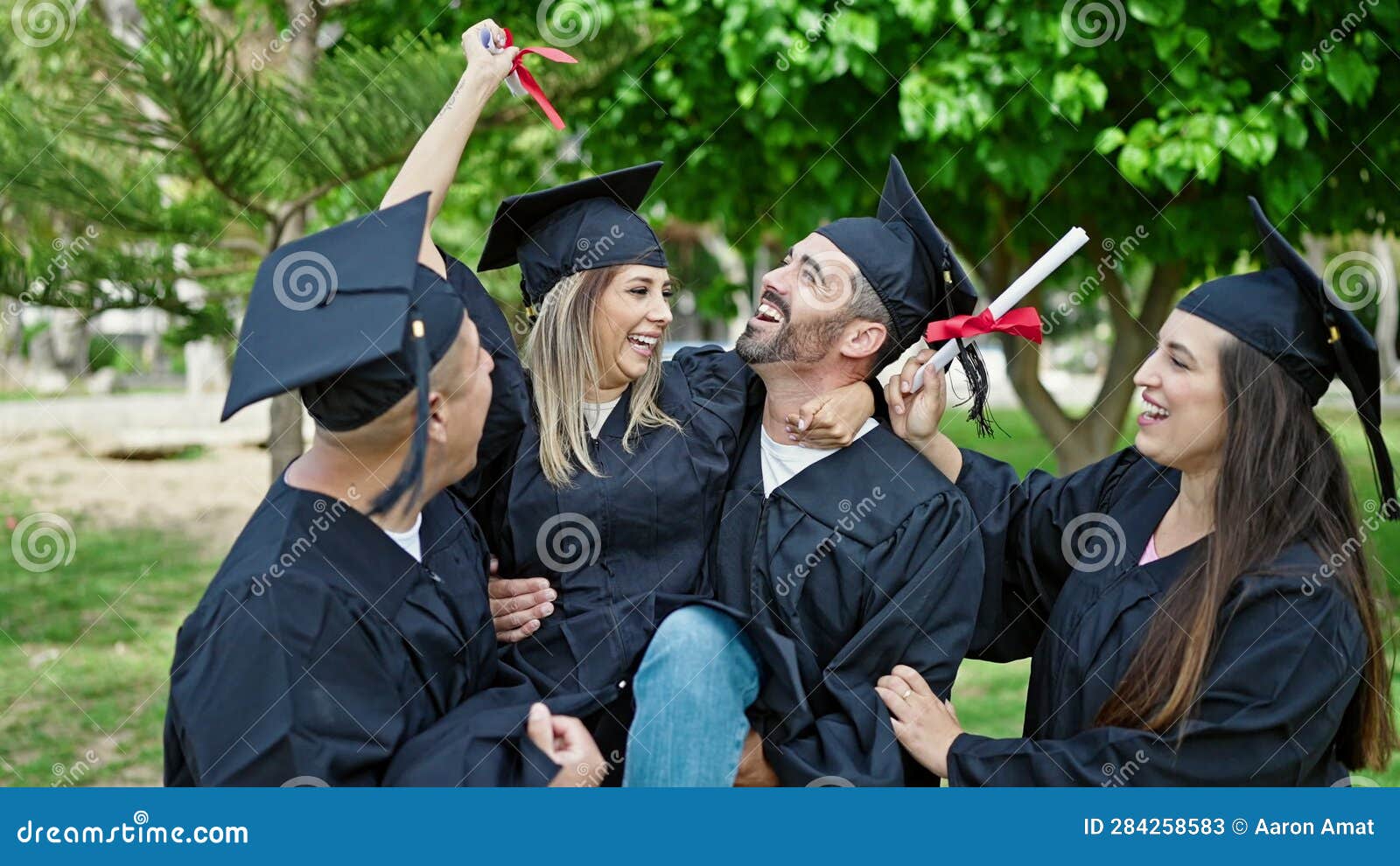 Group of People Students Graduated Holding Diploma with Winner ...