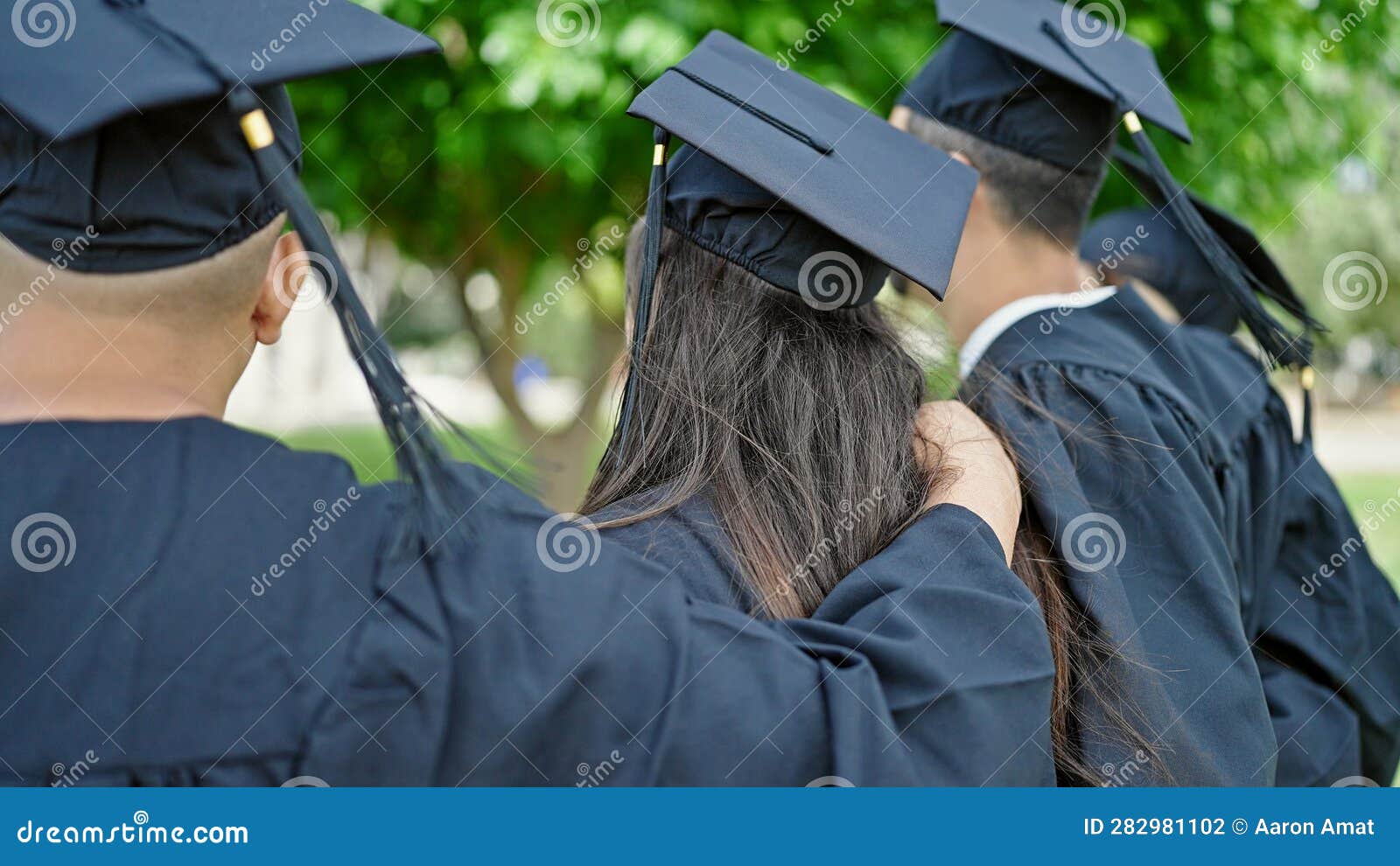 Group of People Students Graduated Hugging Each Other Backwards at ...