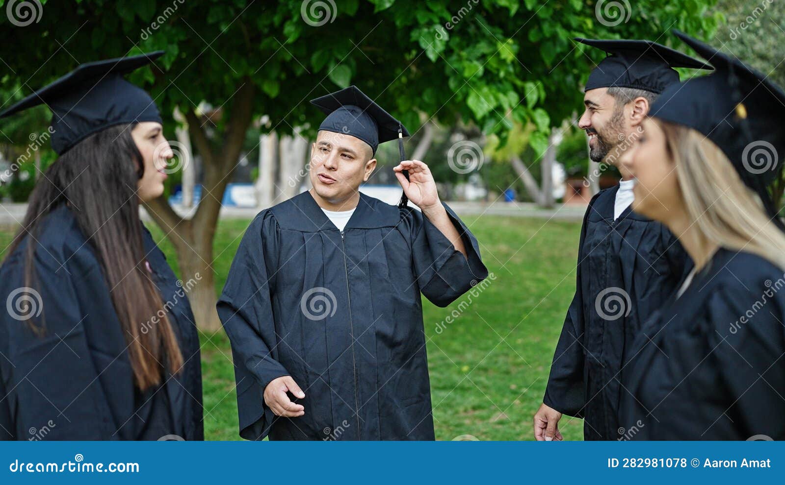 Group of People Students Graduated Speaking at University Campus Stock ...