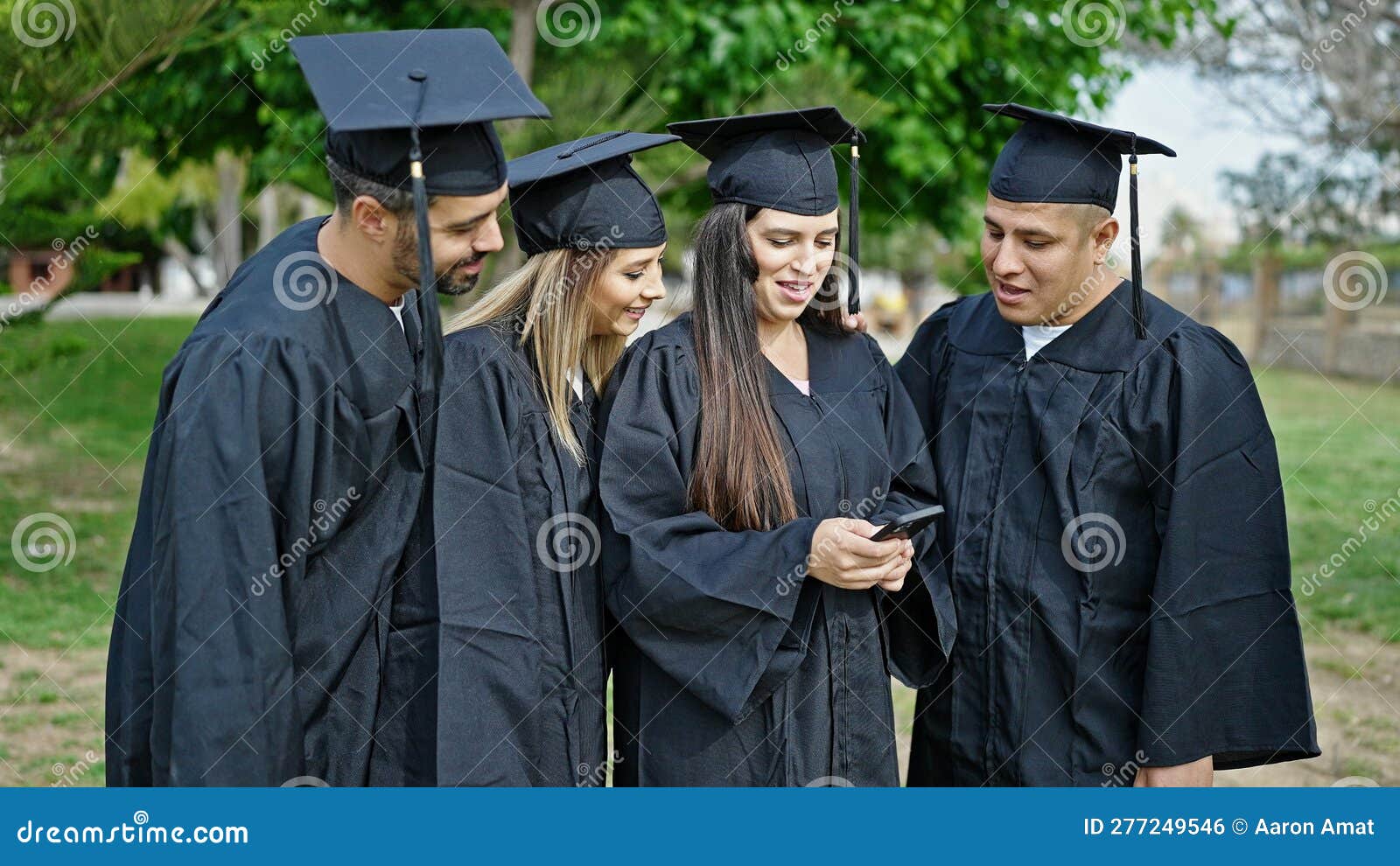 Group of People Students Graduated Using Smartphone at University ...