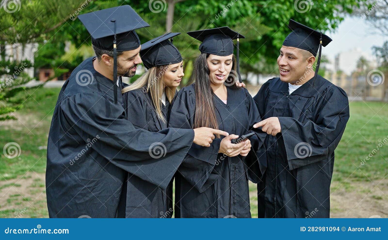 Group of People Students Graduated Using Smartphone at University ...