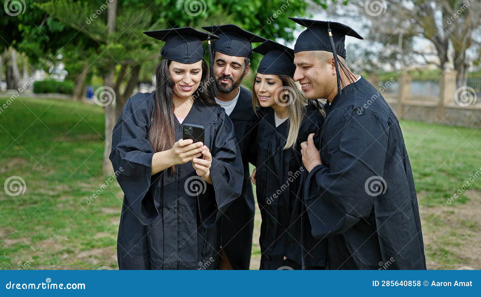 Group of People Students Graduated Using Smartphone at University ...