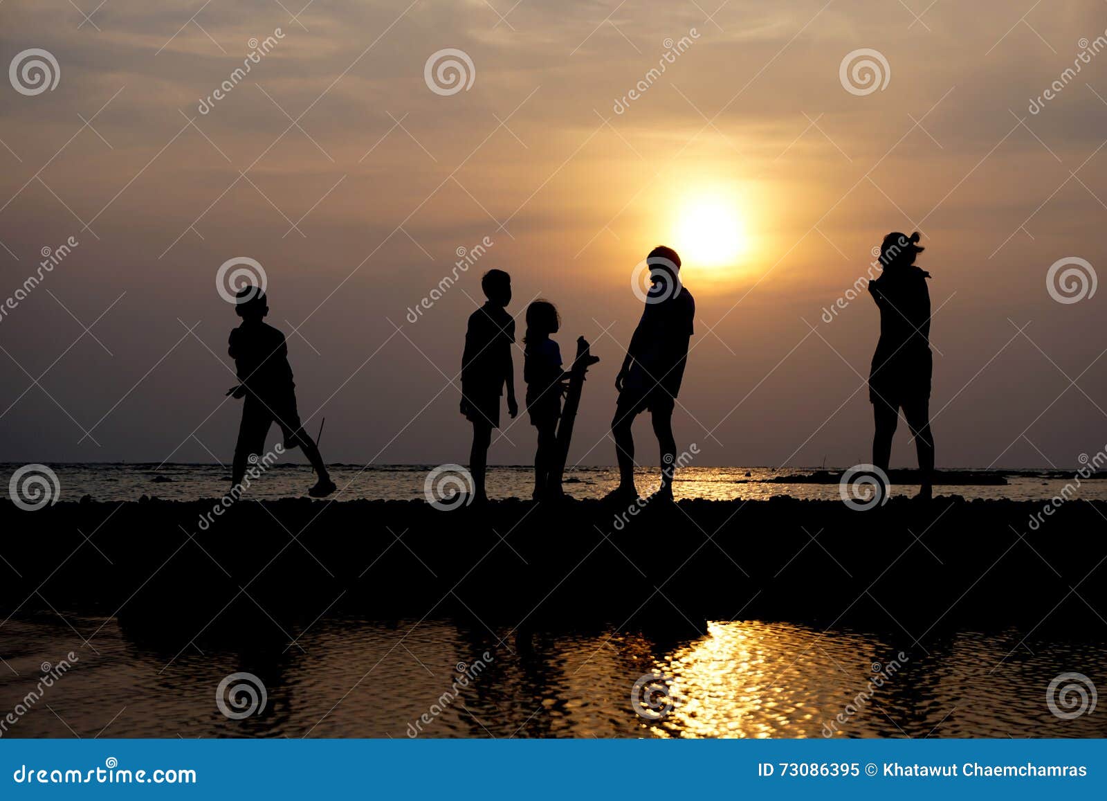 Group of People at Sunset on the Beach Stock Image - Image of leisure ...
