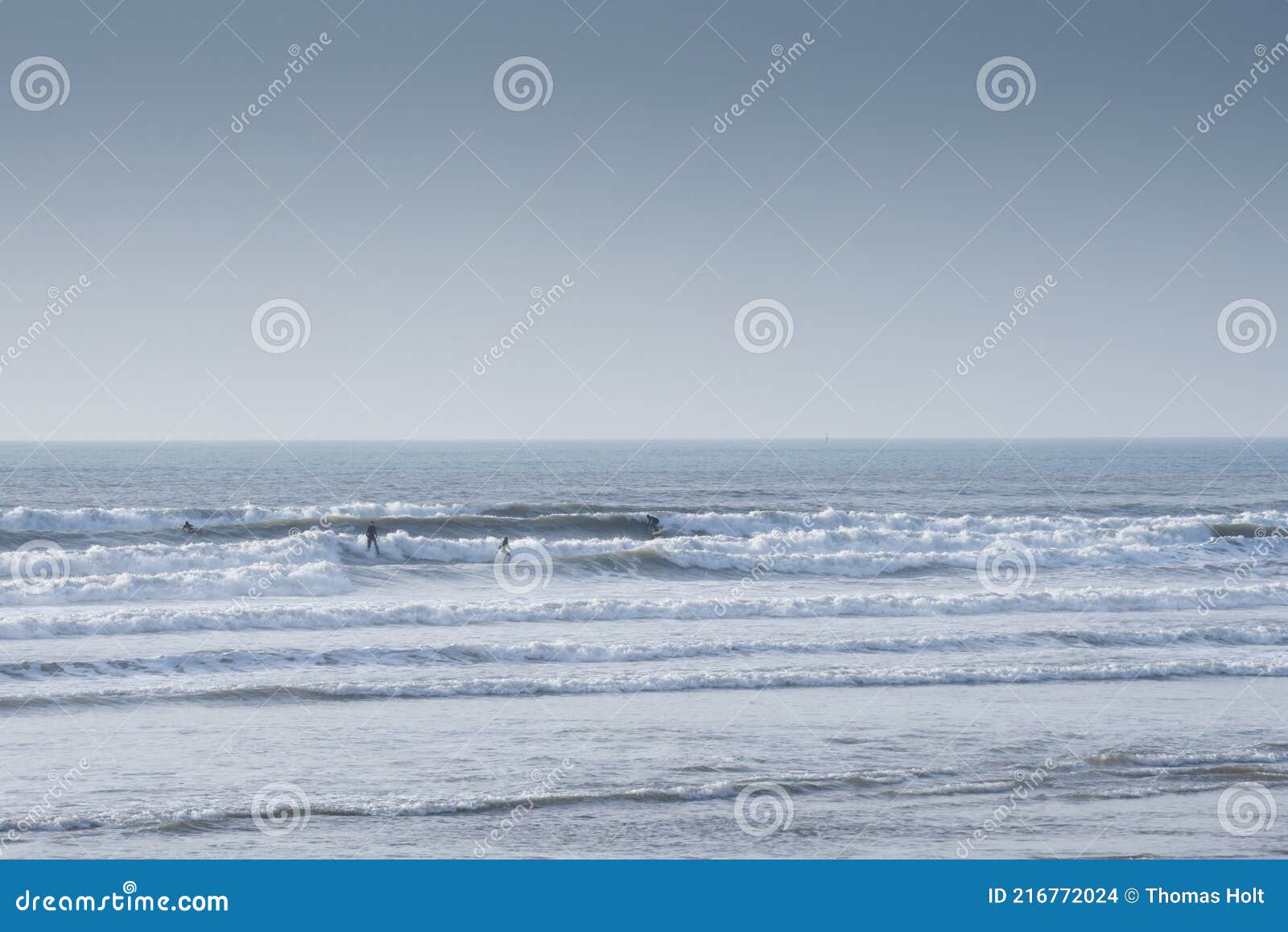 Group of People are Surfing and Catching Waves in the Ocean Stock Photo ...