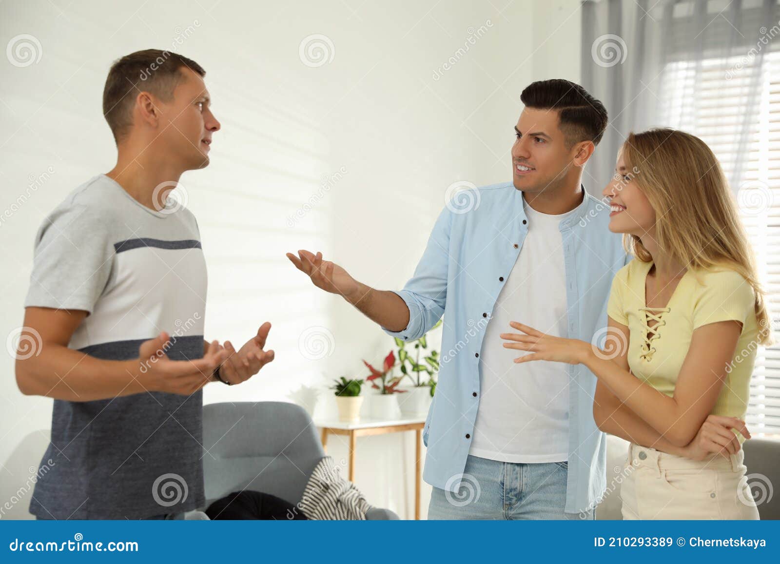 Group of People Talking in Living Room Stock Image - Image of family ...