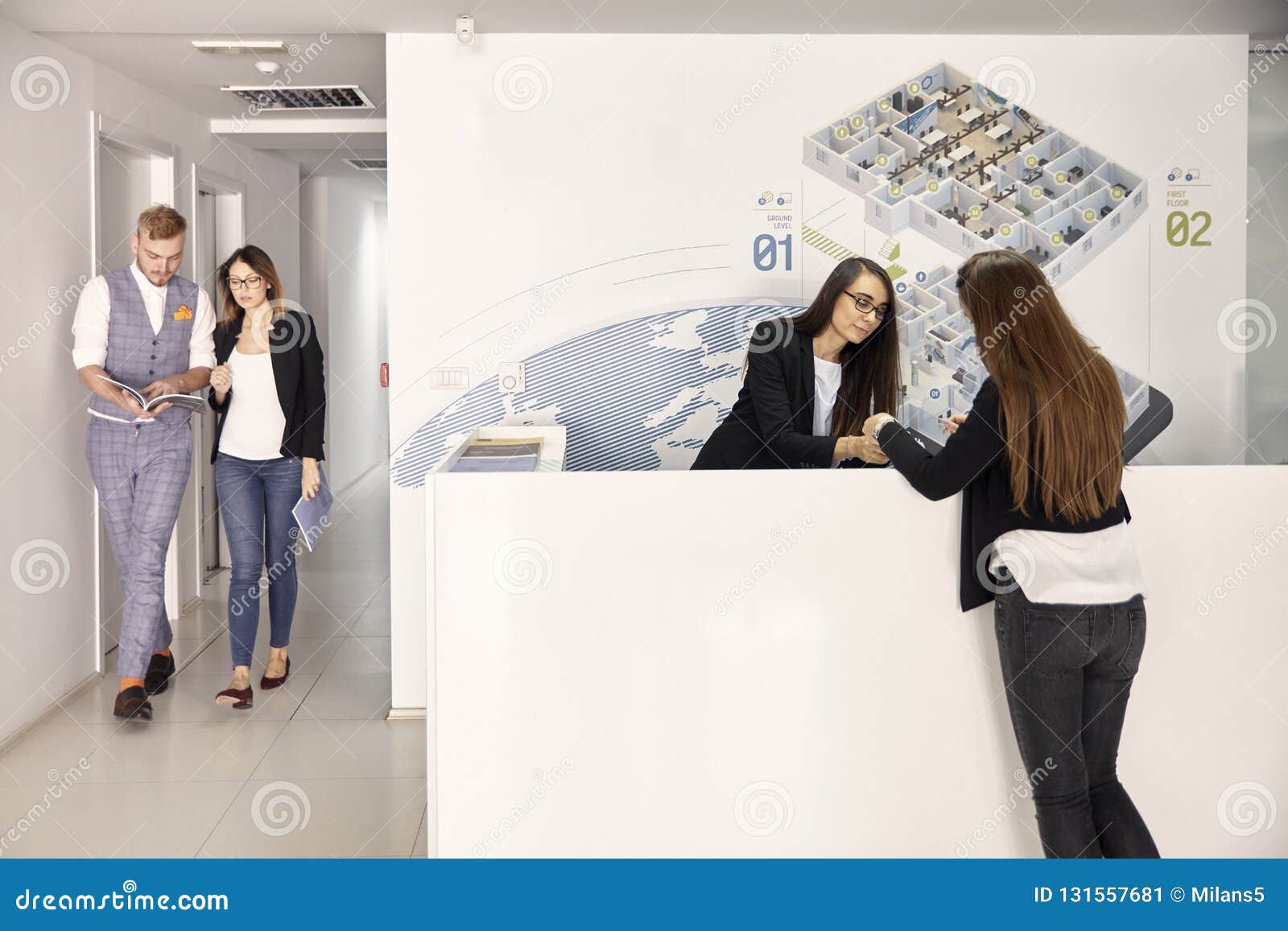 Group of People, Two People Walking, Two Women Looking at Papers in ...