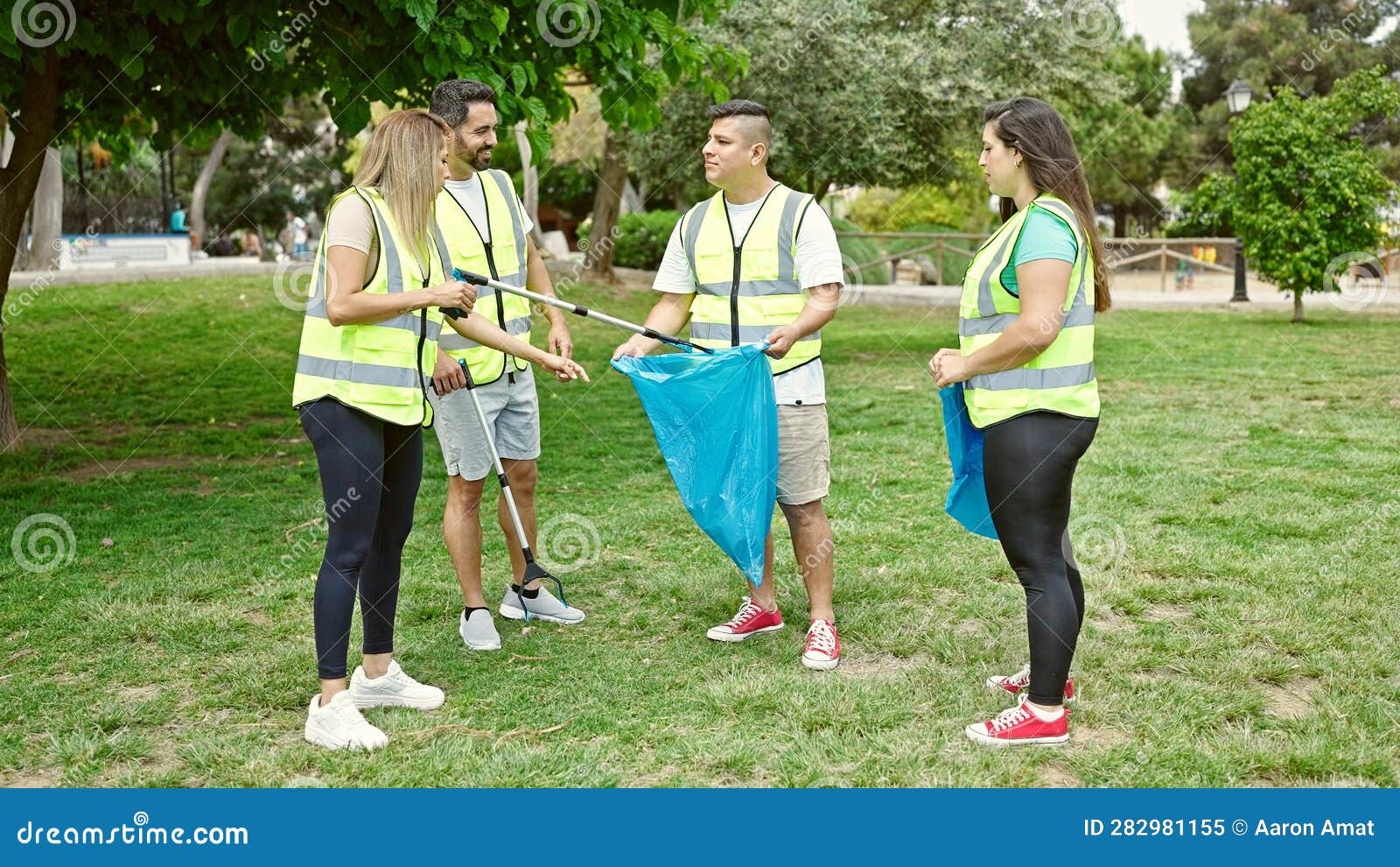 Group of People Volunteers Collecting Trash at Park Stock Image - Image ...