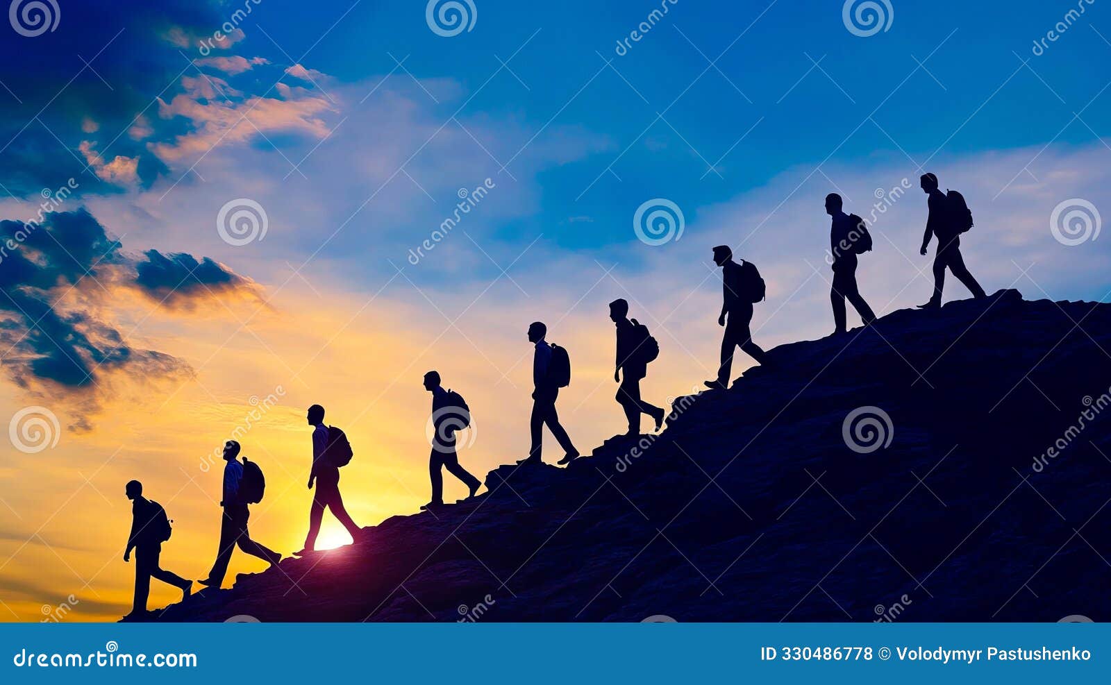 A Group of People Walking Up a Mountain at Sunset Stock Photo - Image ...