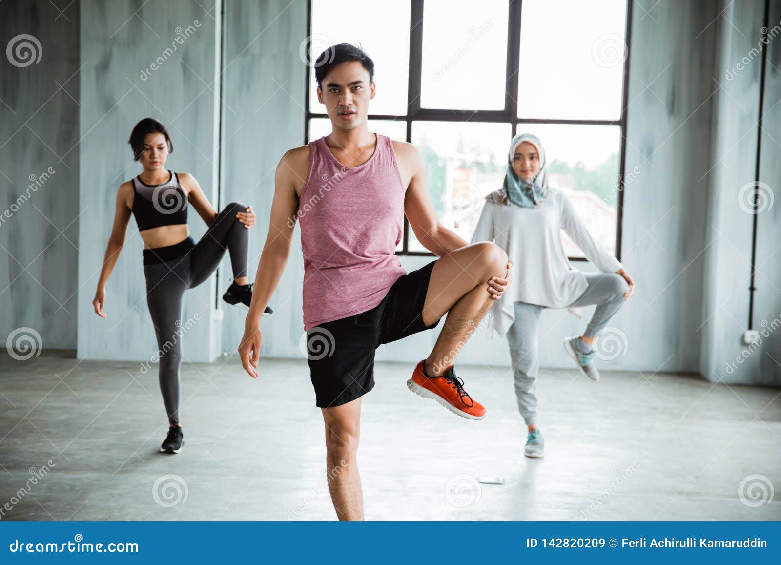 A Group of People Warming Up before Doing Core Gymnastics Stock Image ...