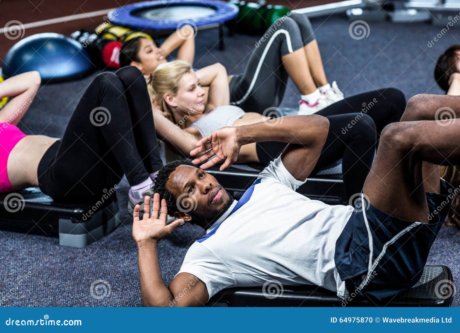 Group of People Working Their Abs Stock Photo - Image of group, crunch ...