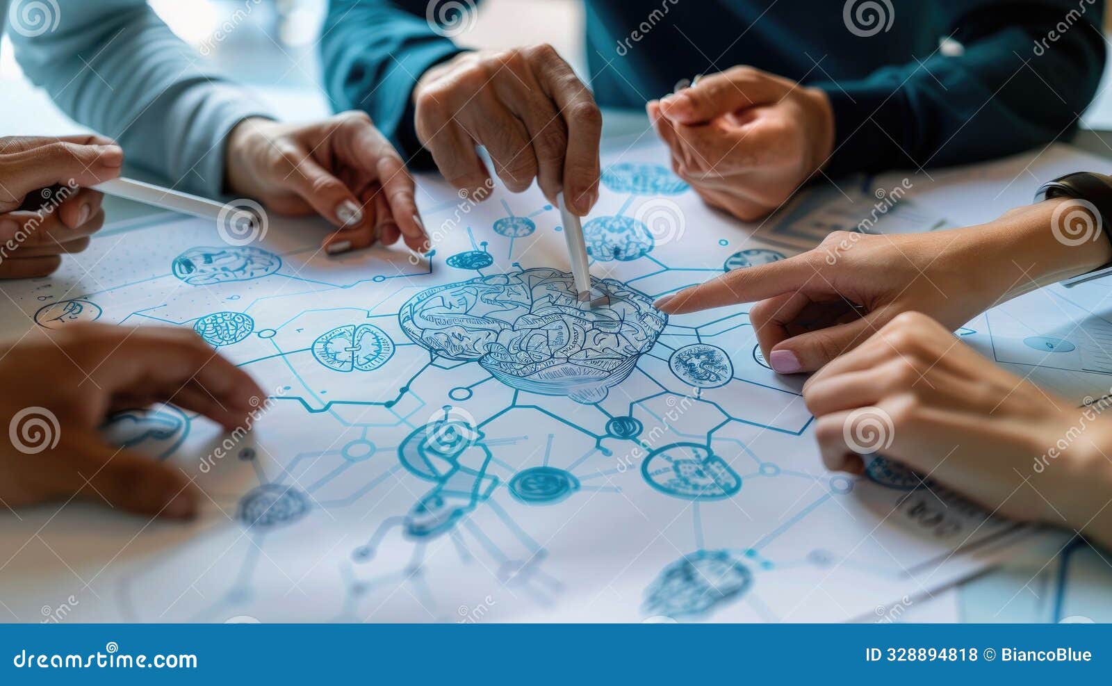 A Group of People are Working Together on a Project they are Looking at ...