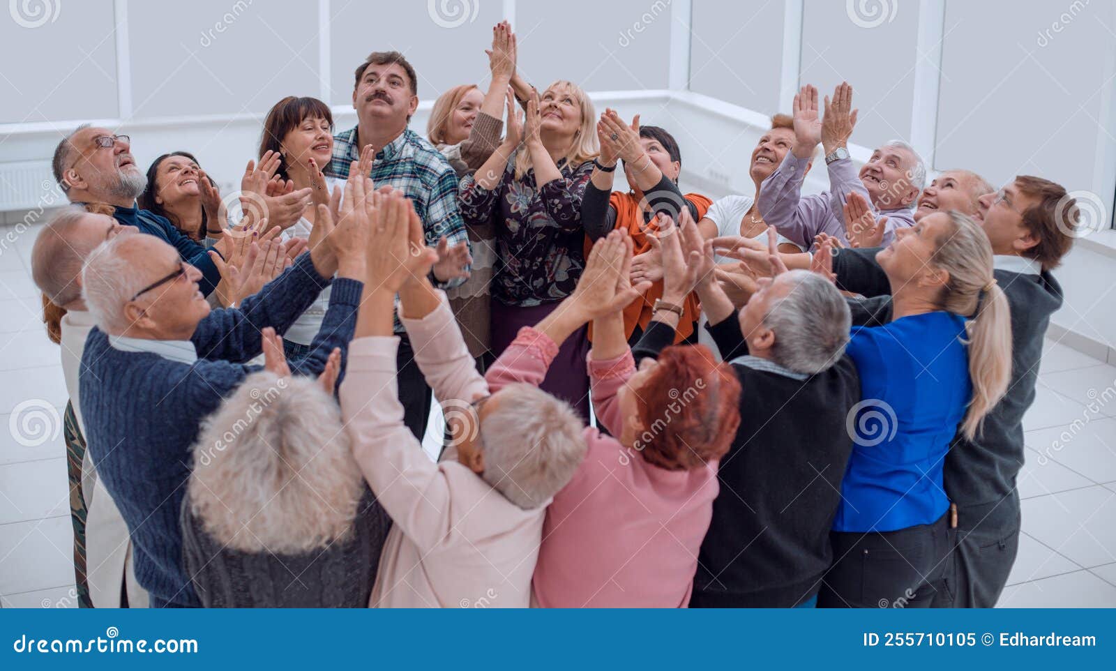 A Group of People in Years Applaud Themselves Stock Image - Image of ...