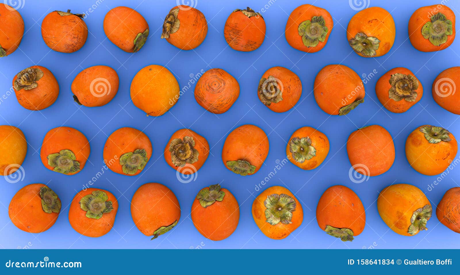 Group of Persimmon Fruits on a Blue Background in a Flat Lay Style ...