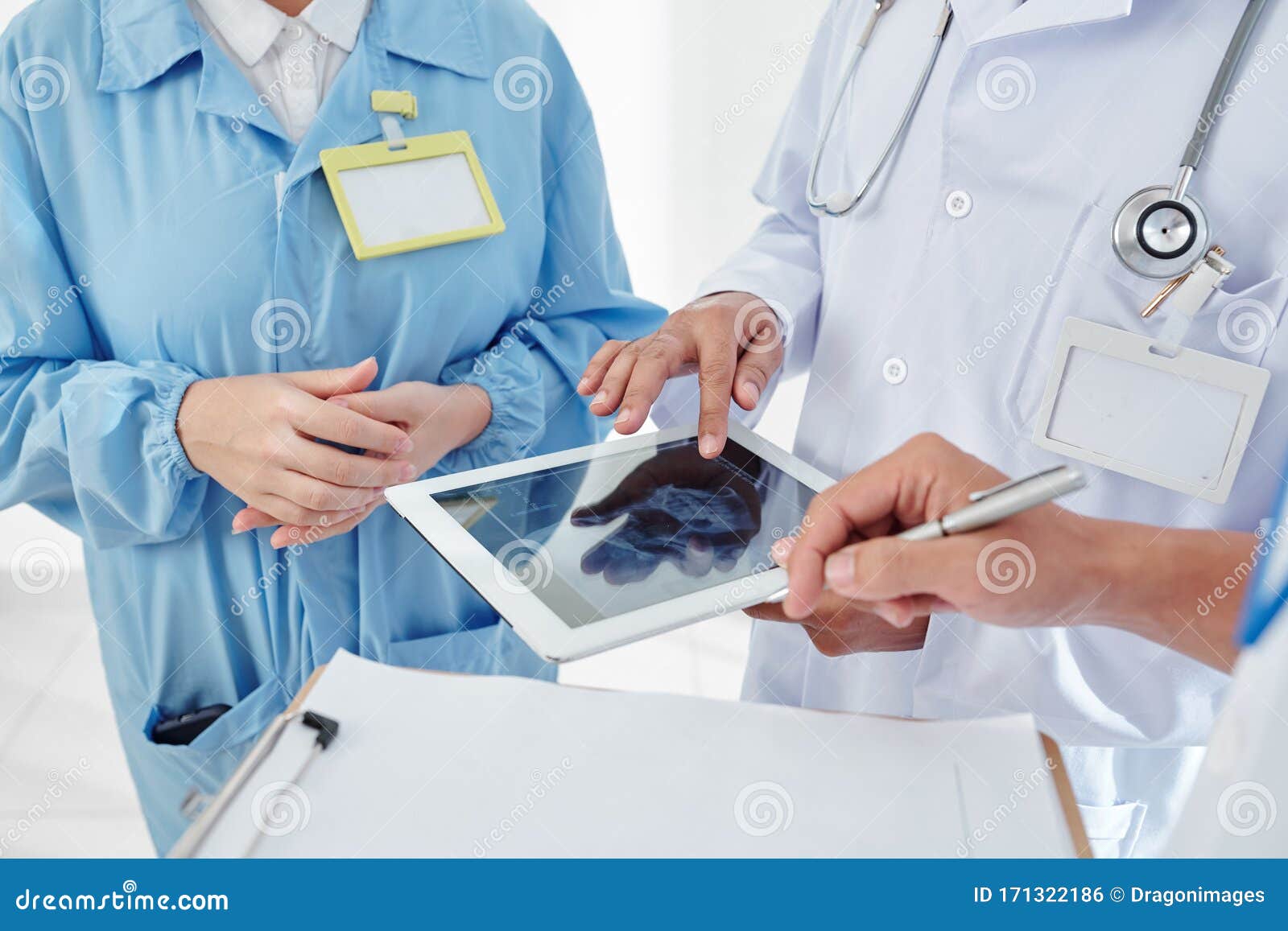 Physicians Planning Surgery Stock Photo - Image of illness, medicine ...