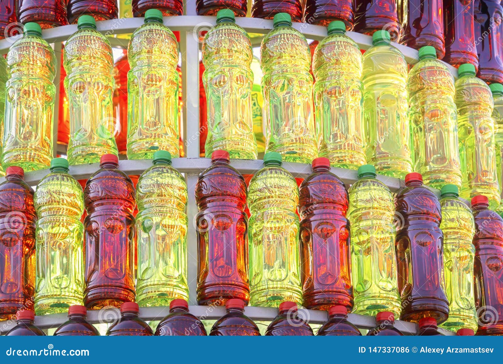 Group of Plastic Bottles of Red and Green Color Lined Up in a Pyramid ...