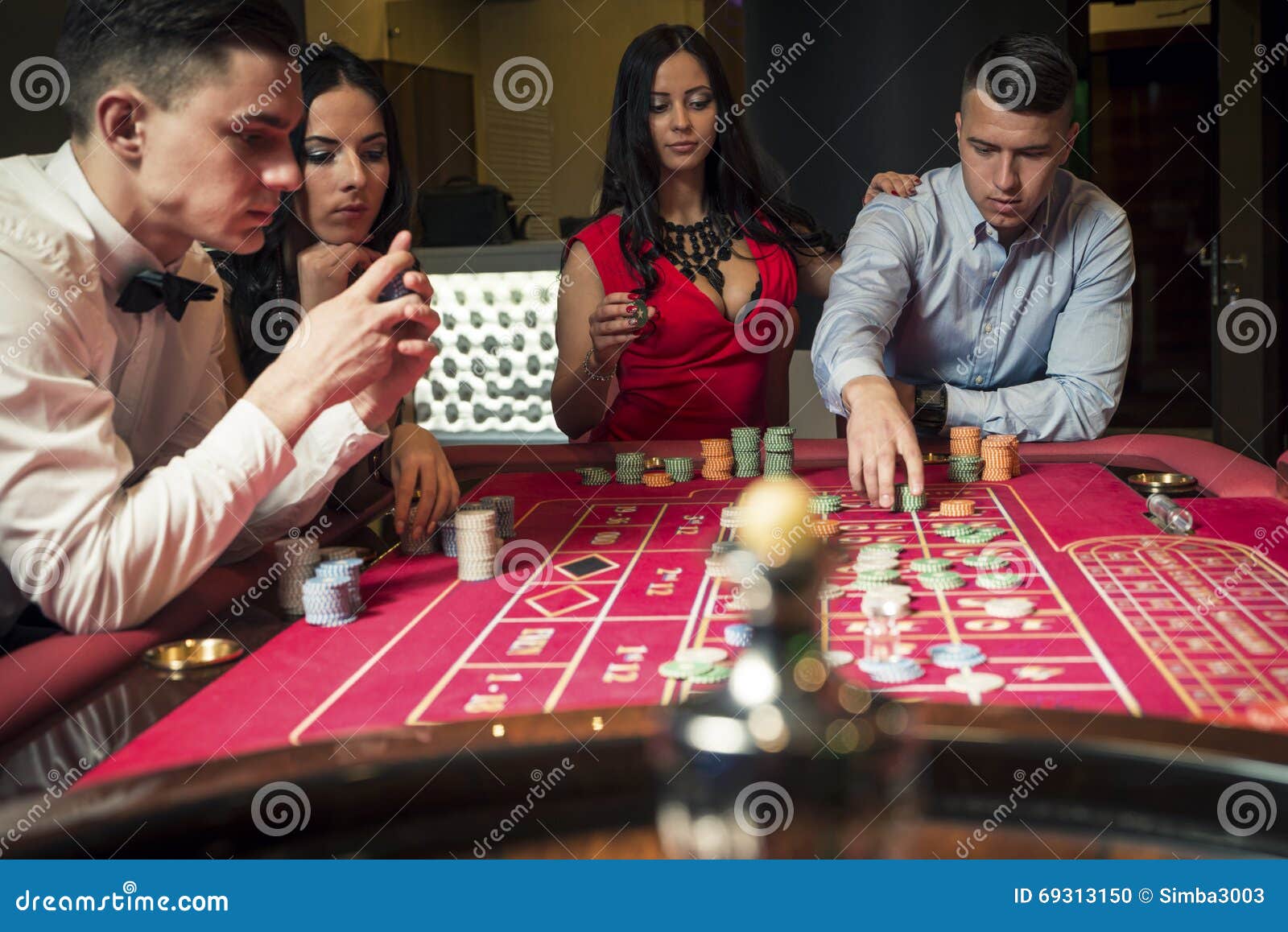 Group Playing Roulette stock photo. Image of caucasian - 69313150