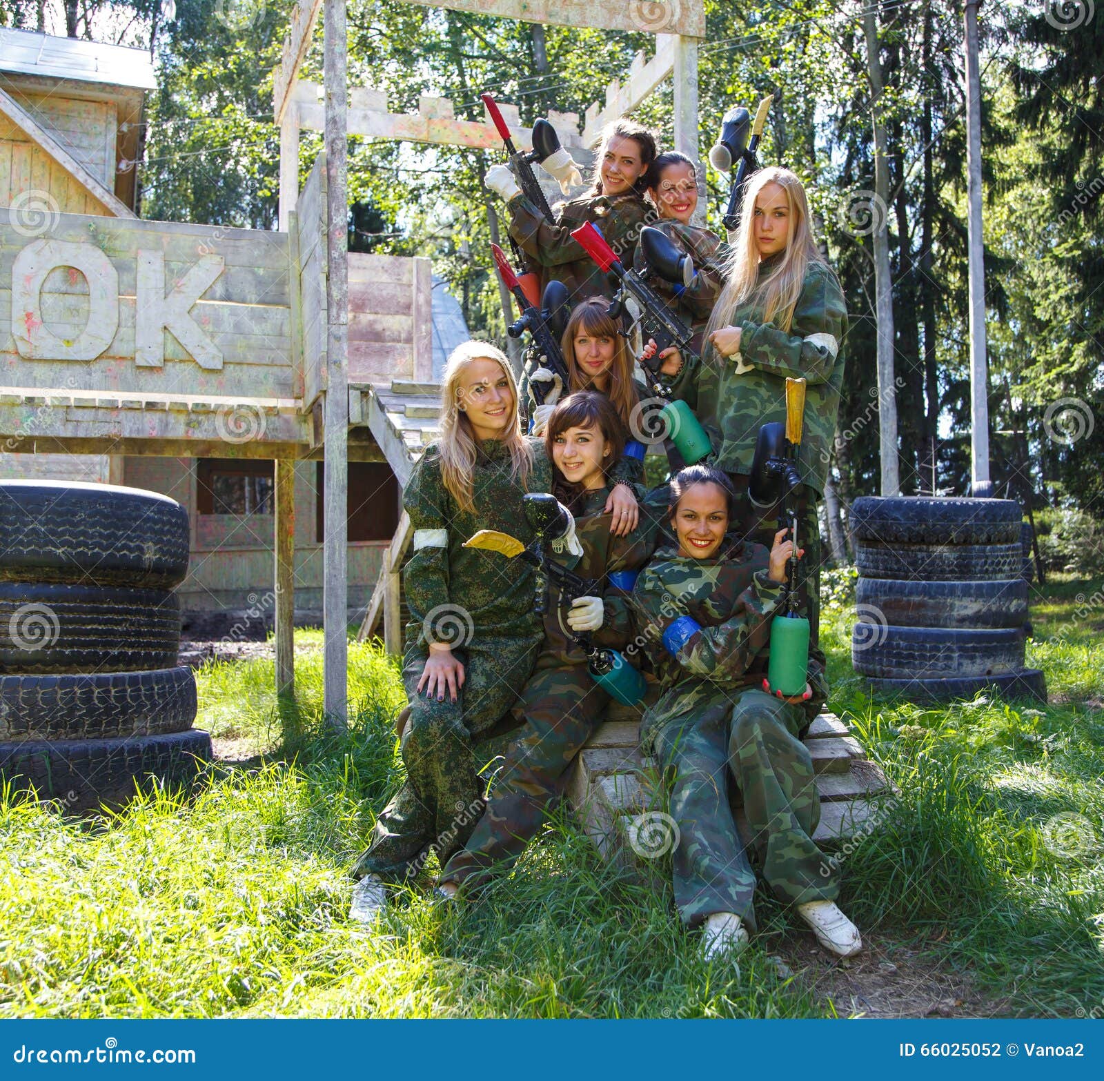 Group Portrait of Female Models Posing in Military Uniform Stock Photo ...