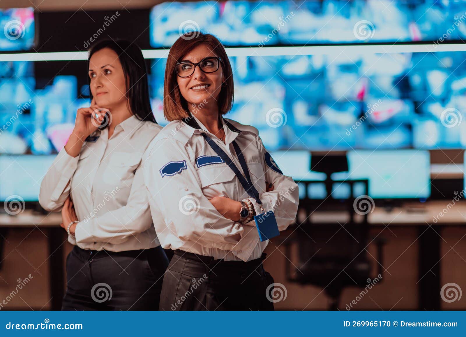 Group Portrait of Female Security Operator while Working in a Data ...