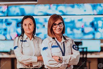 Group Portrait of Female Security Operator while Working in a Data ...