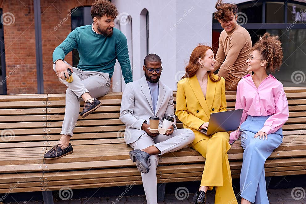 Group Portrait of Interracial Businesspeople Posing Together in Bench ... Group Portrait of Interracial Businesspeople Posing Together in Bench ...