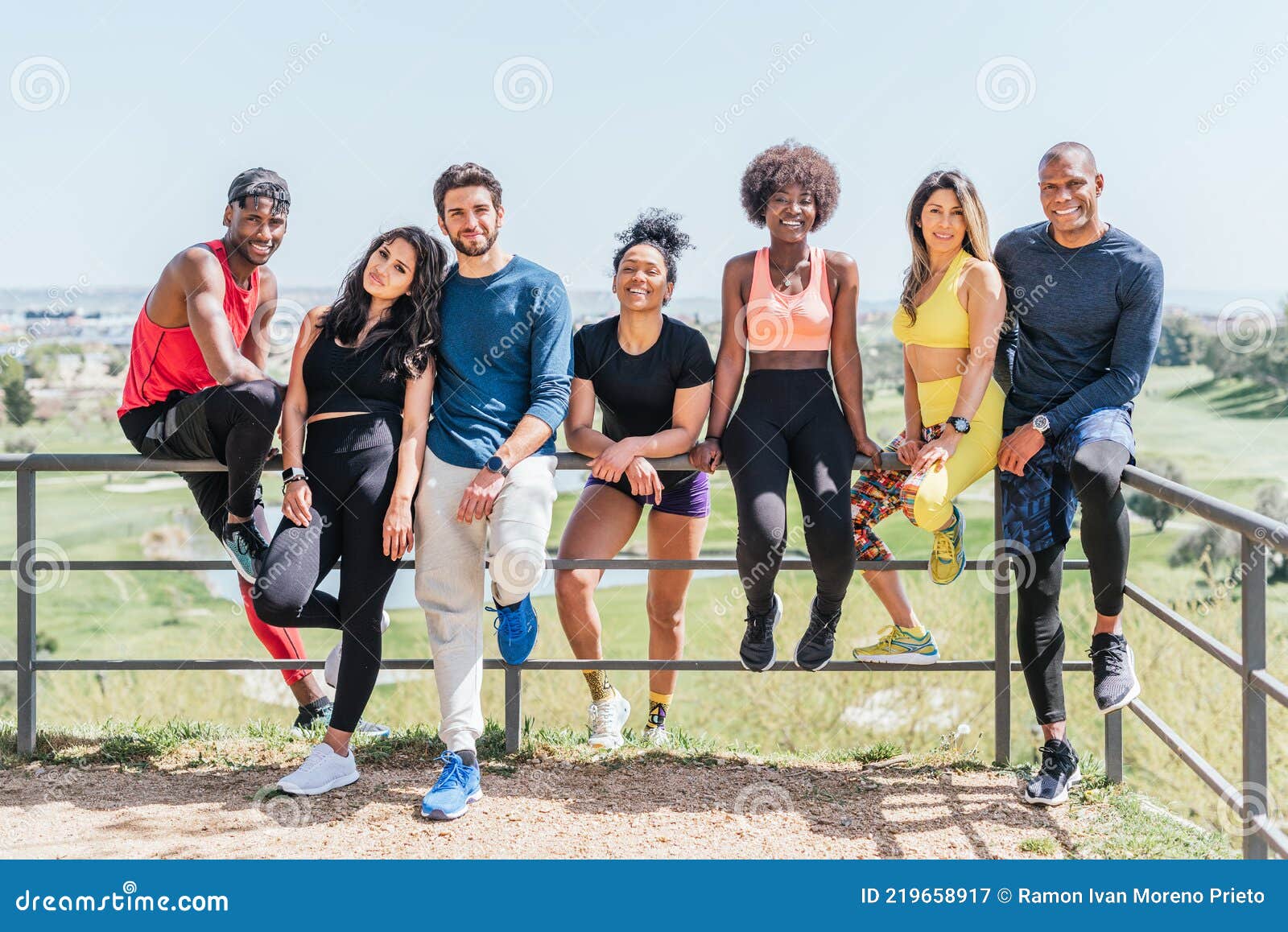 Group Portrait of Runners Smiling at Camera. Stock Image - Image of ...