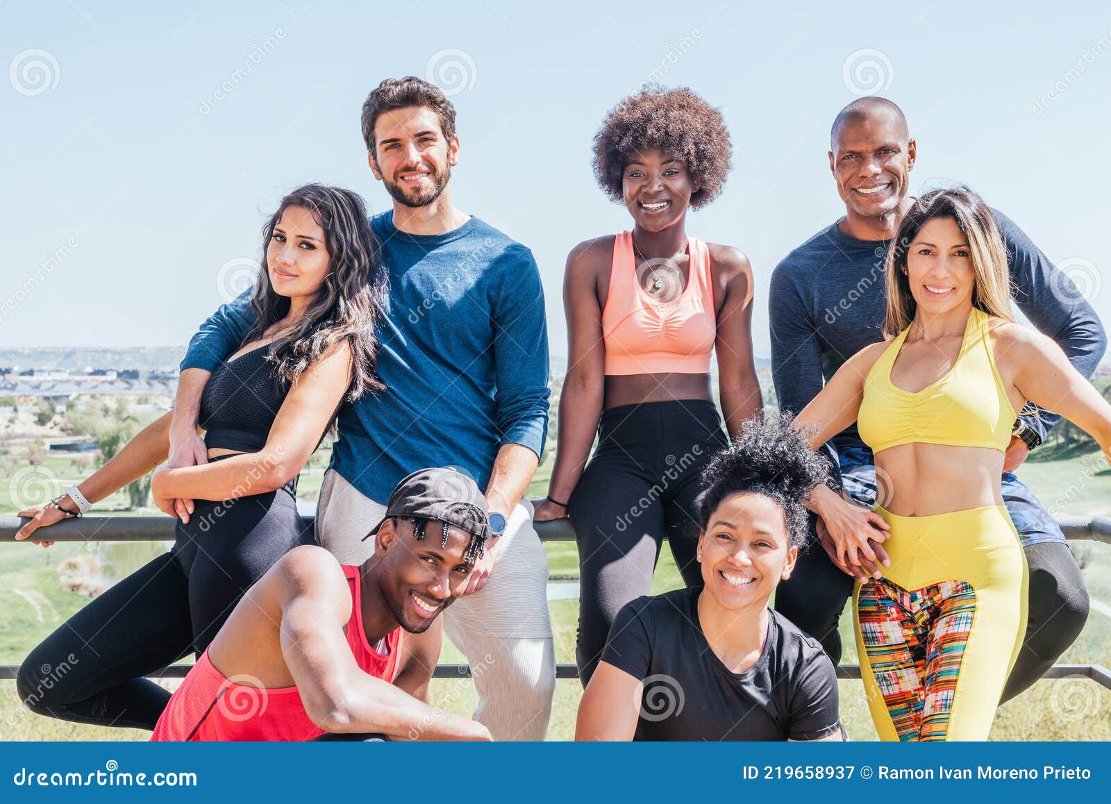 Group Portrait of Runners Smiling at Camera. Stock Image - Image of ...