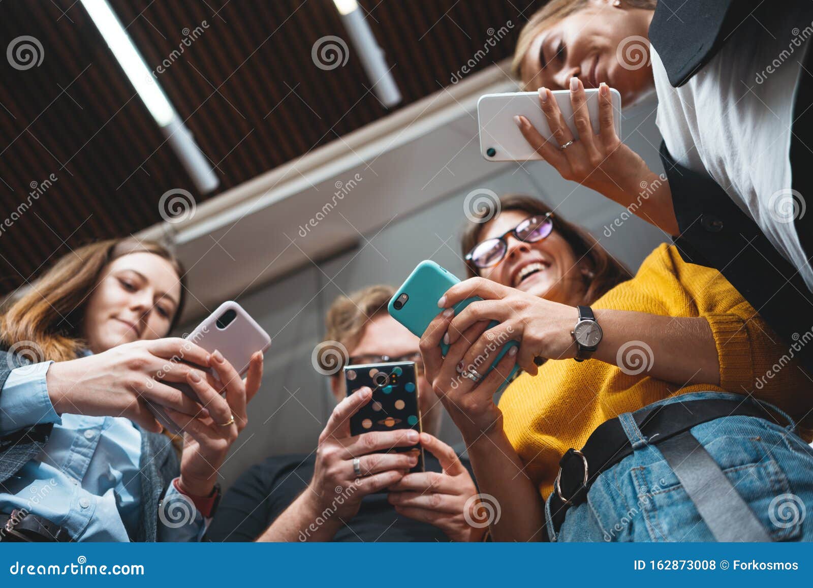 Group of Positive Business People Working Together and Using Modern ...