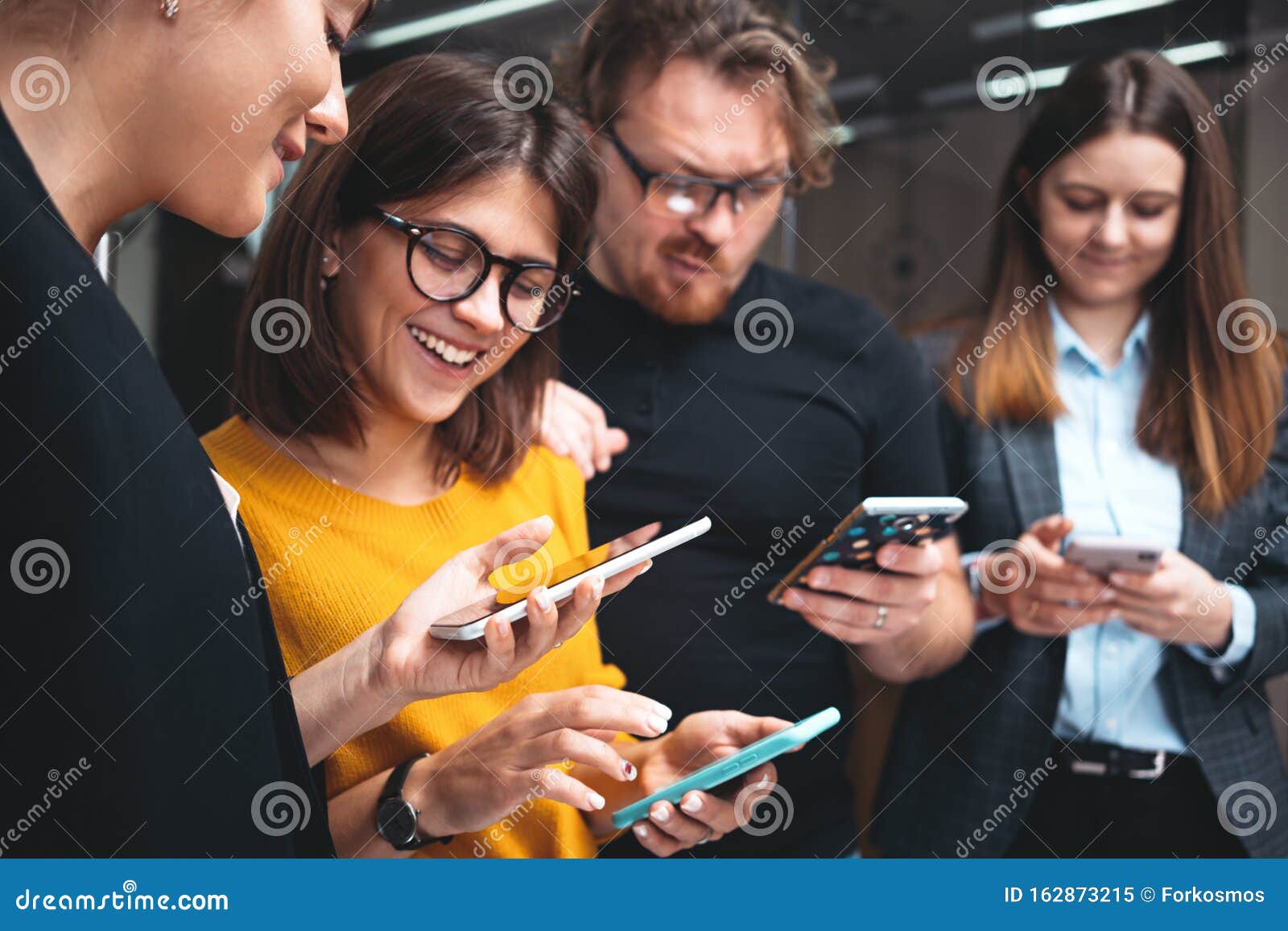 Group of Positive Business People Working Together and Using Modern ...