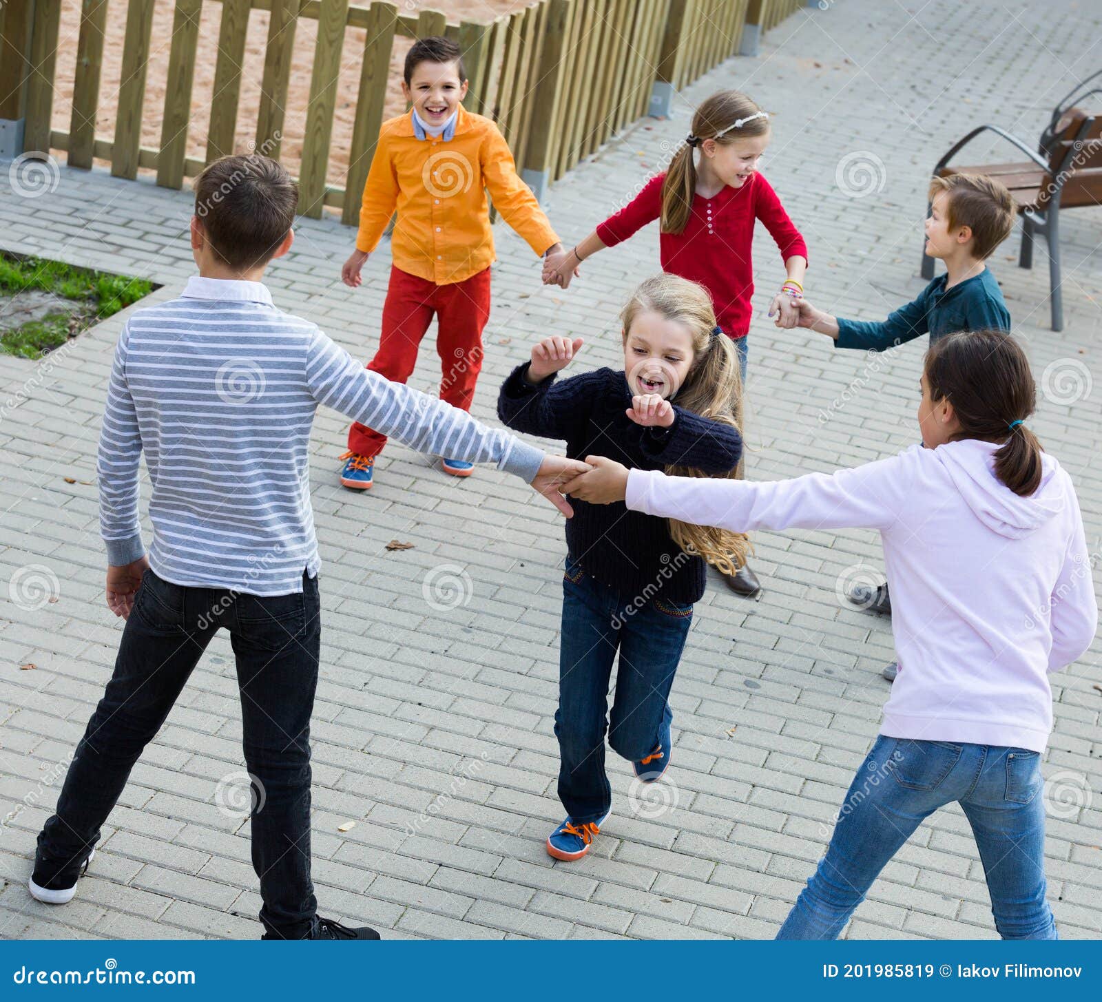 Group Of Positive Children Playing Red Rover Stock Image ...