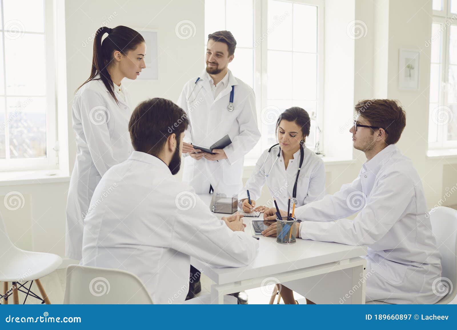 Group of Practicing Doctors in a Meeting Discuss the Diagnosis of a ...