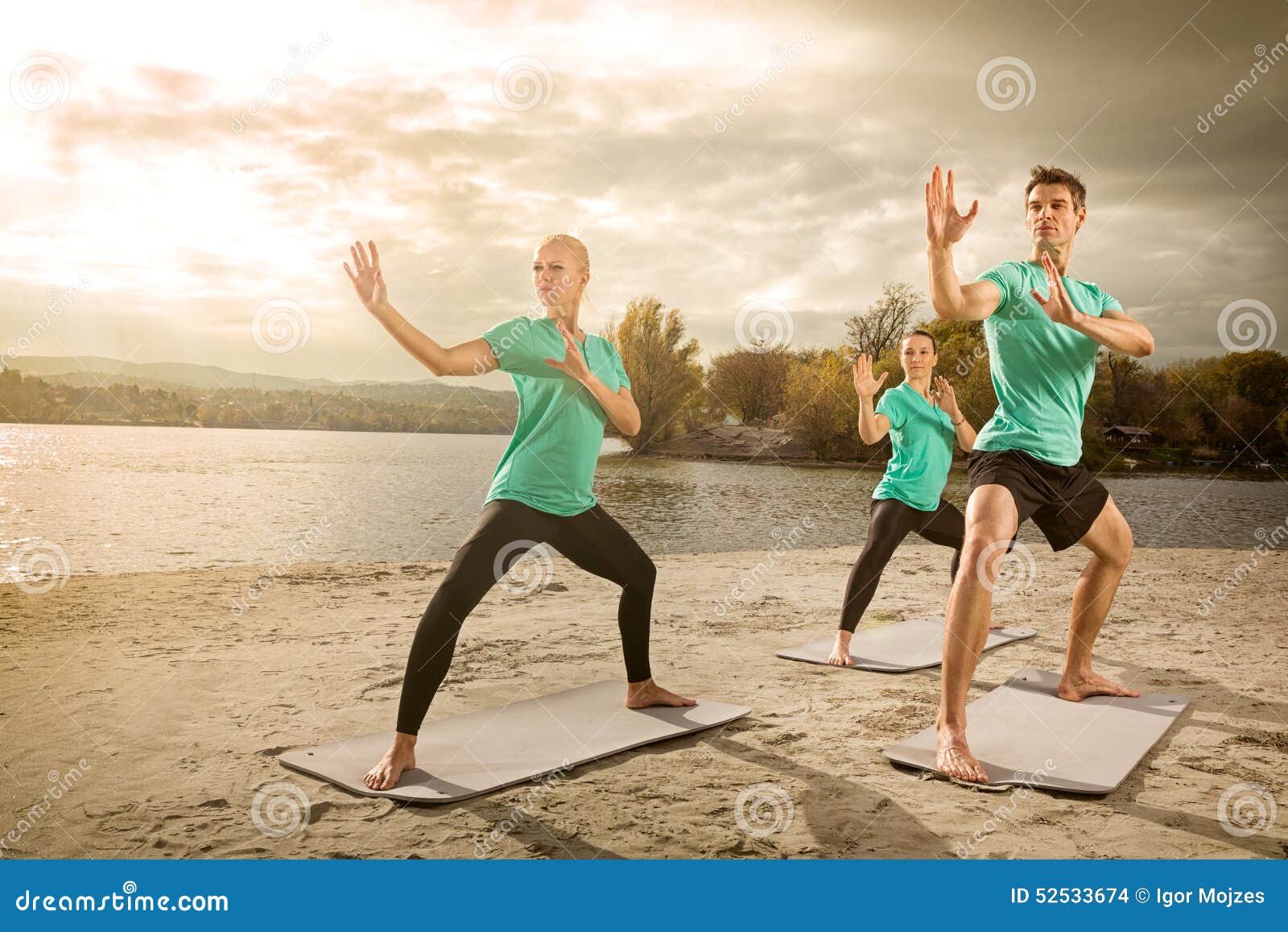 Group practicing yoga stock photo. Image of body, flexibility - 52533674