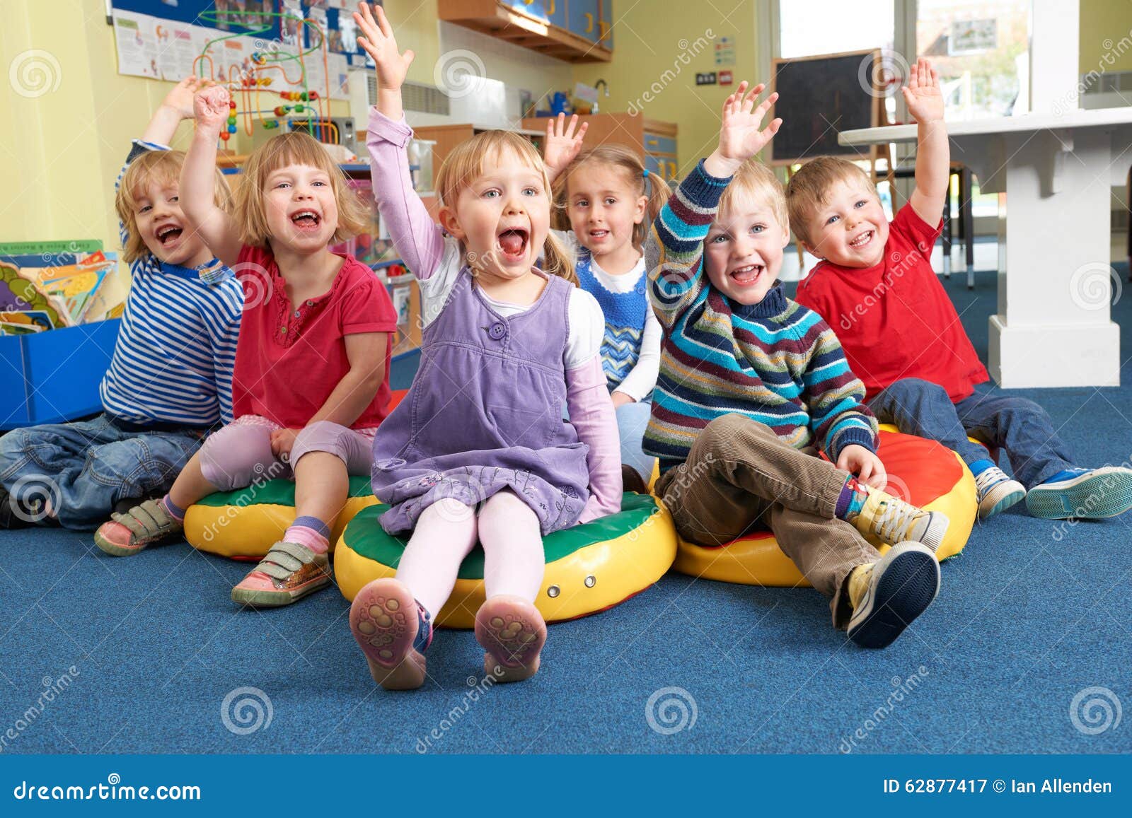 Group of Pre School Children Answering Question in Classroom Stock ... Group of Pre School Children Answering Question in Classroom Stock ...