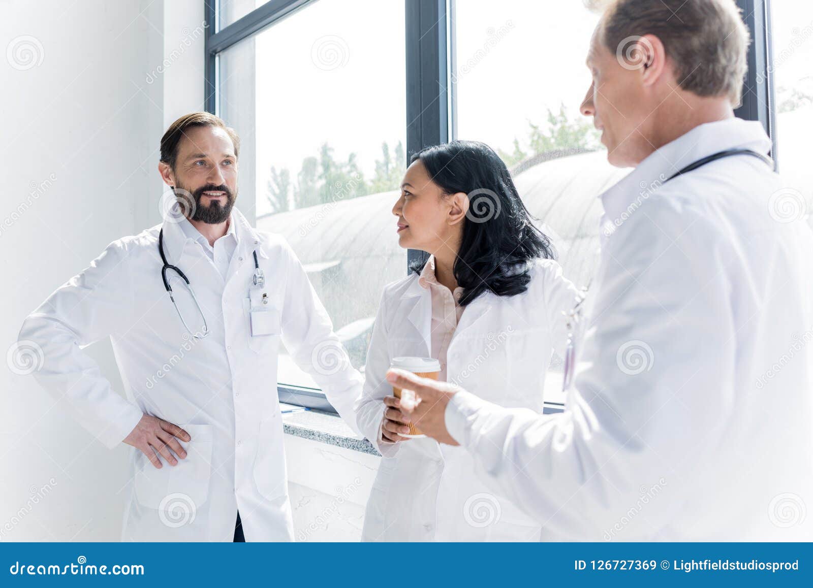 Group of Professional Doctors Talking and Looking at Each Other Stock ...