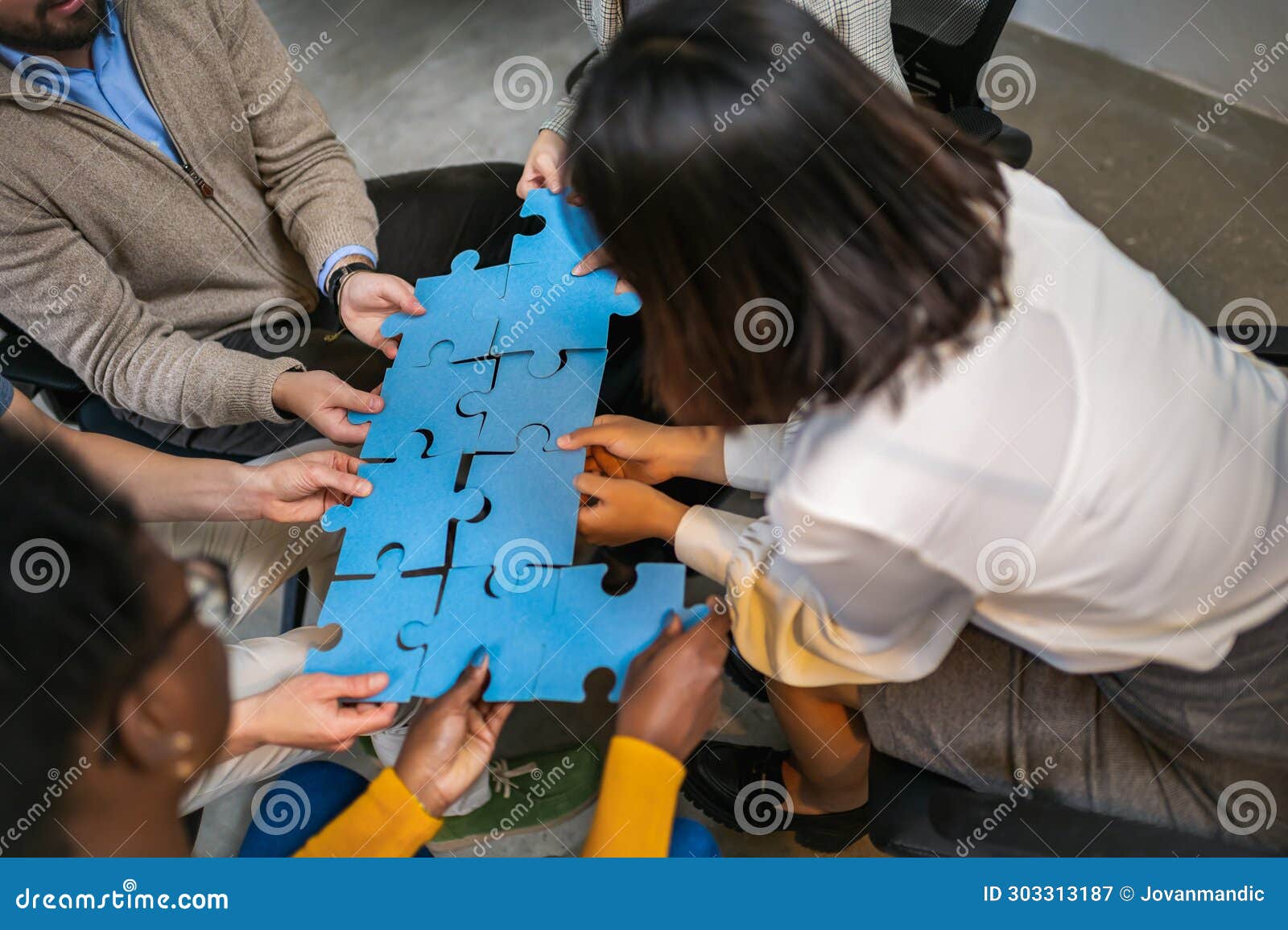 Group of Professional People Playing Puzzle in the Office. Stock Image ...