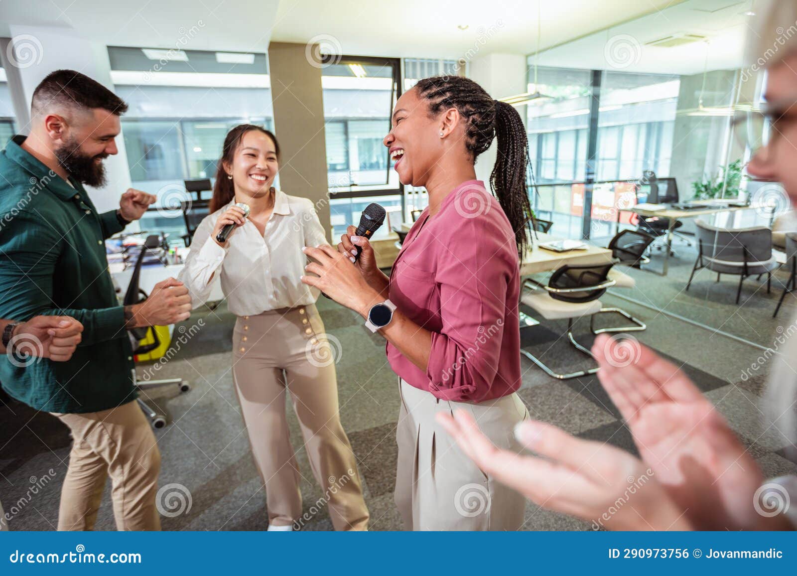 Professional People Singing Karaoke in the Modern Office Stock Photo ...