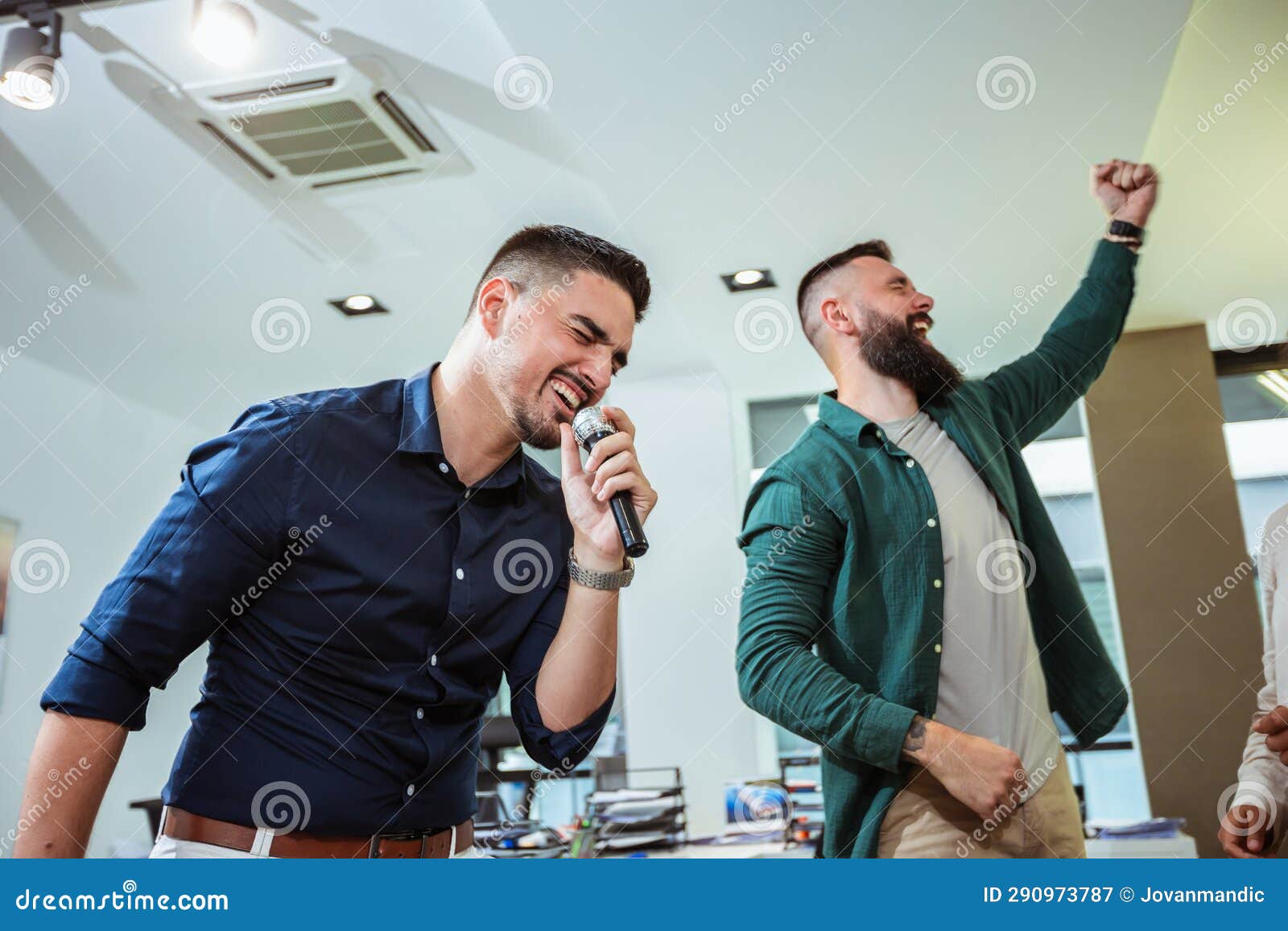 Professional People Singing Karaoke in the Modern Office Stock Image ...