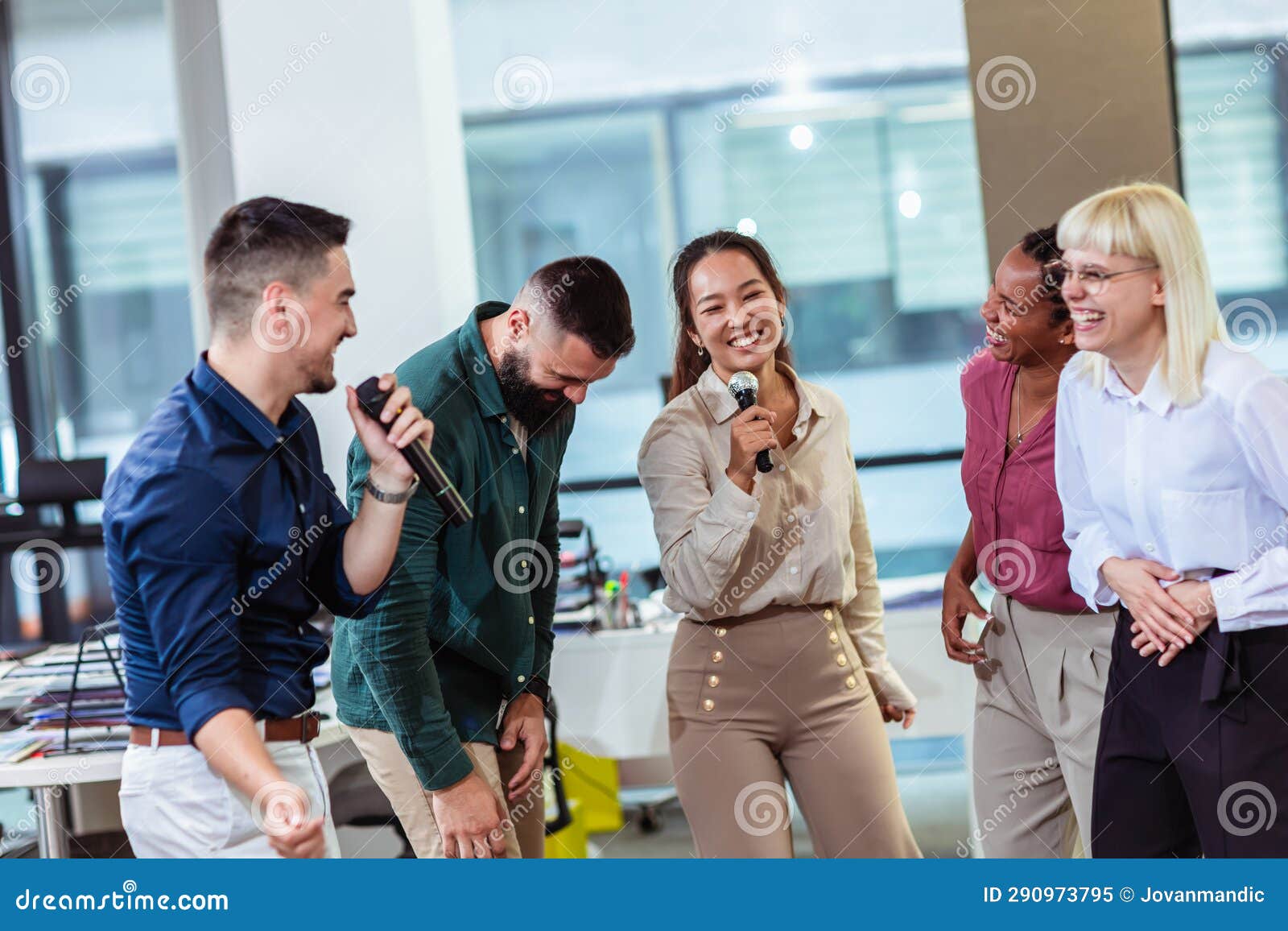 Professional People Singing Karaoke in the Modern Office Stock Image ...