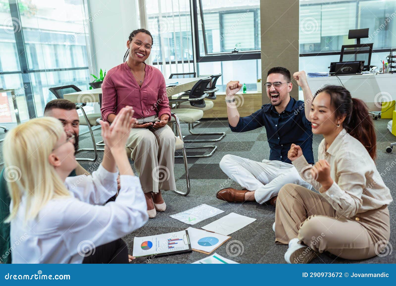 Professional People Sitting on the Floor of the Office and Working ...