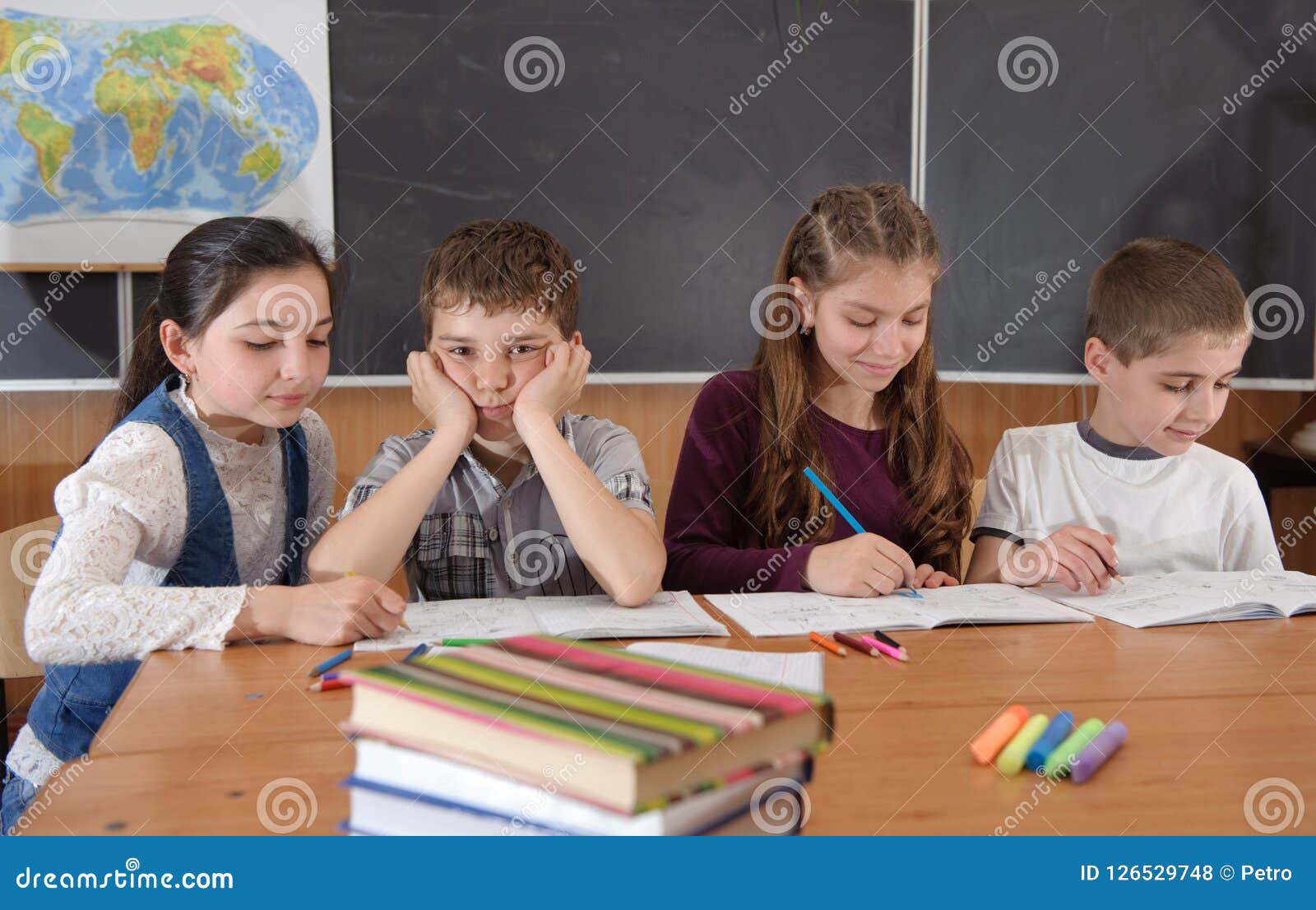 Elementary school pupils stock photo. Image of geography - 126529748